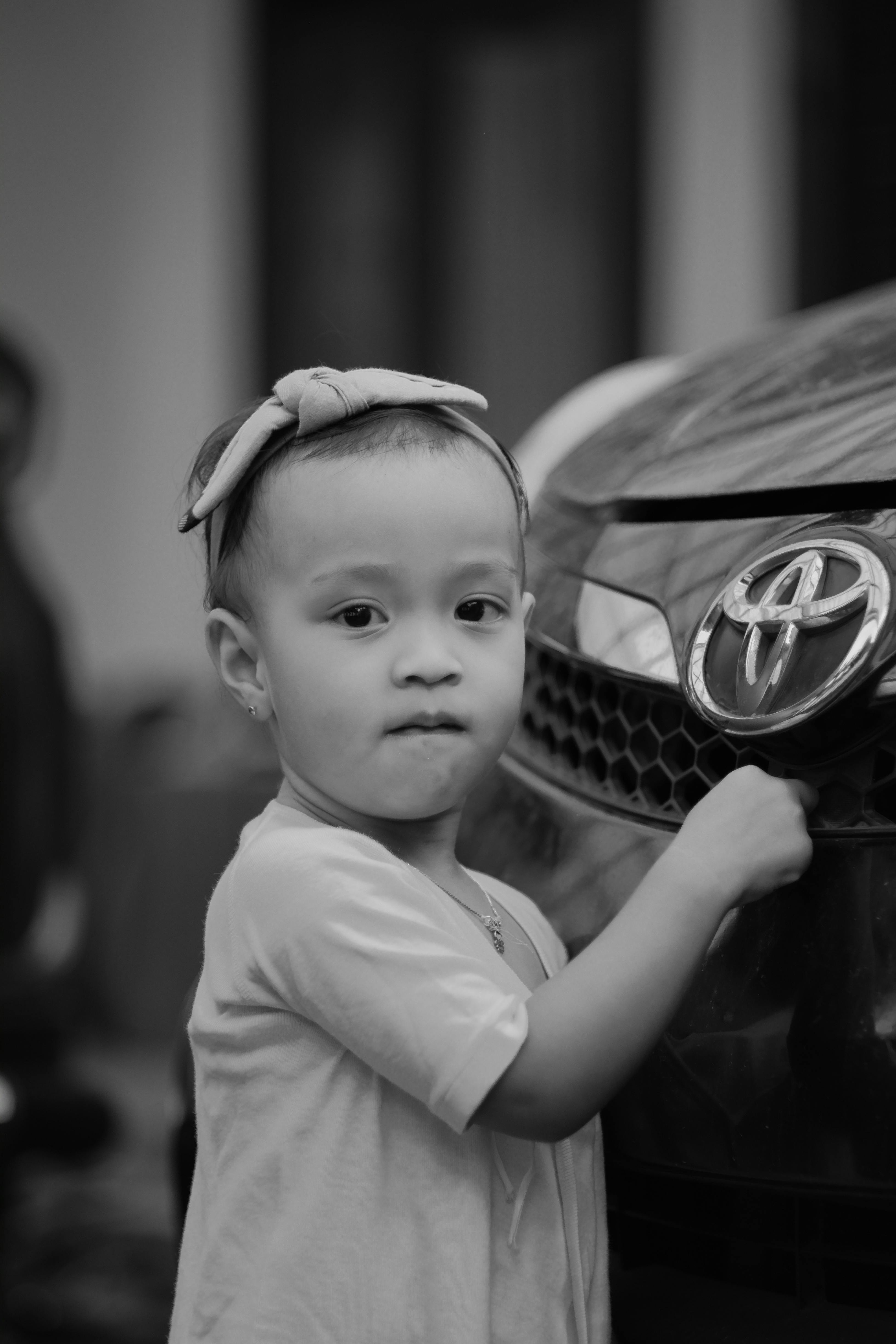 Grayscale Photo of Two Adorable Children · Free Stock Photo