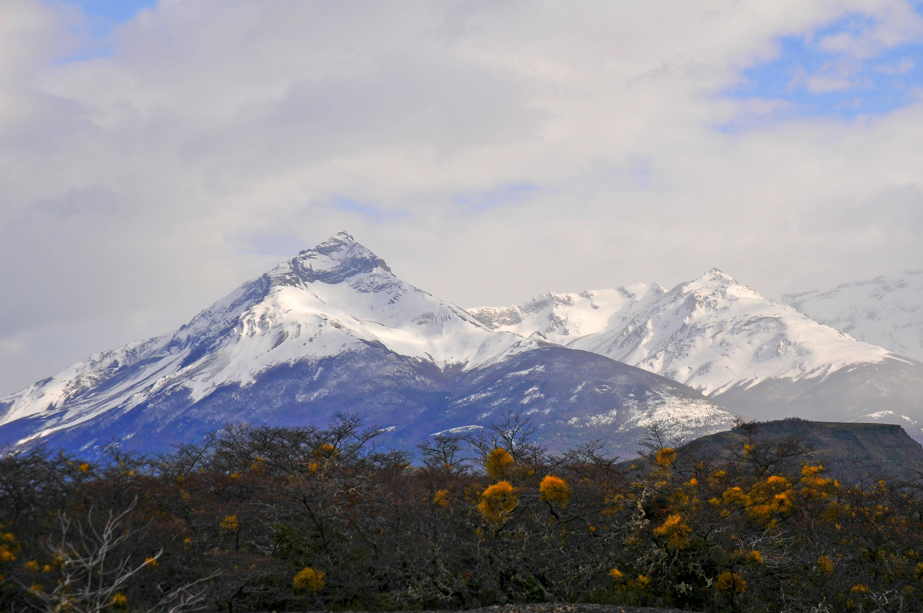 Snow Covered Mountains Under the White Clouds · Free Stock Photo