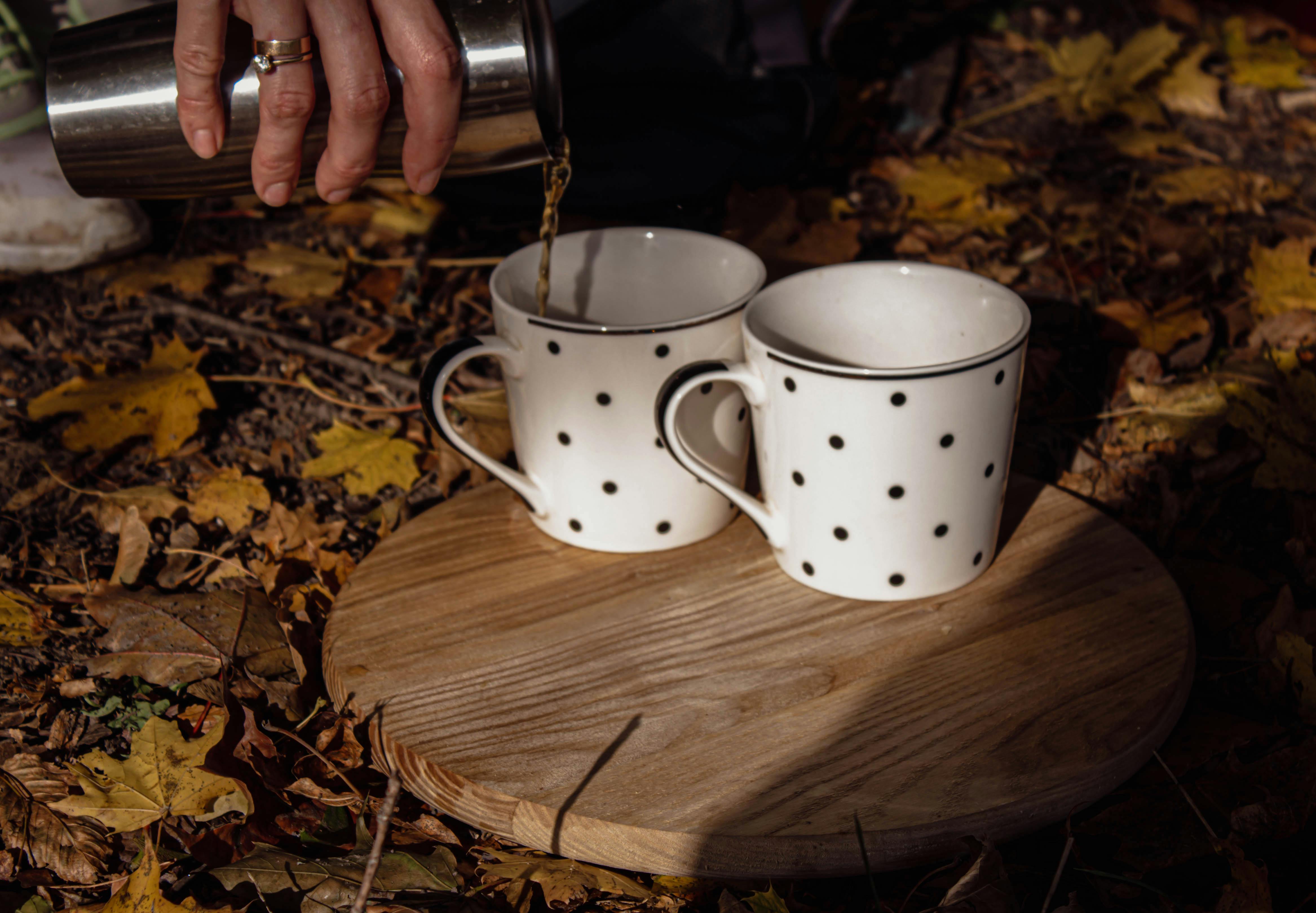White Ceramic Mugs on Wooden Chopping Board · Free Stock Photo