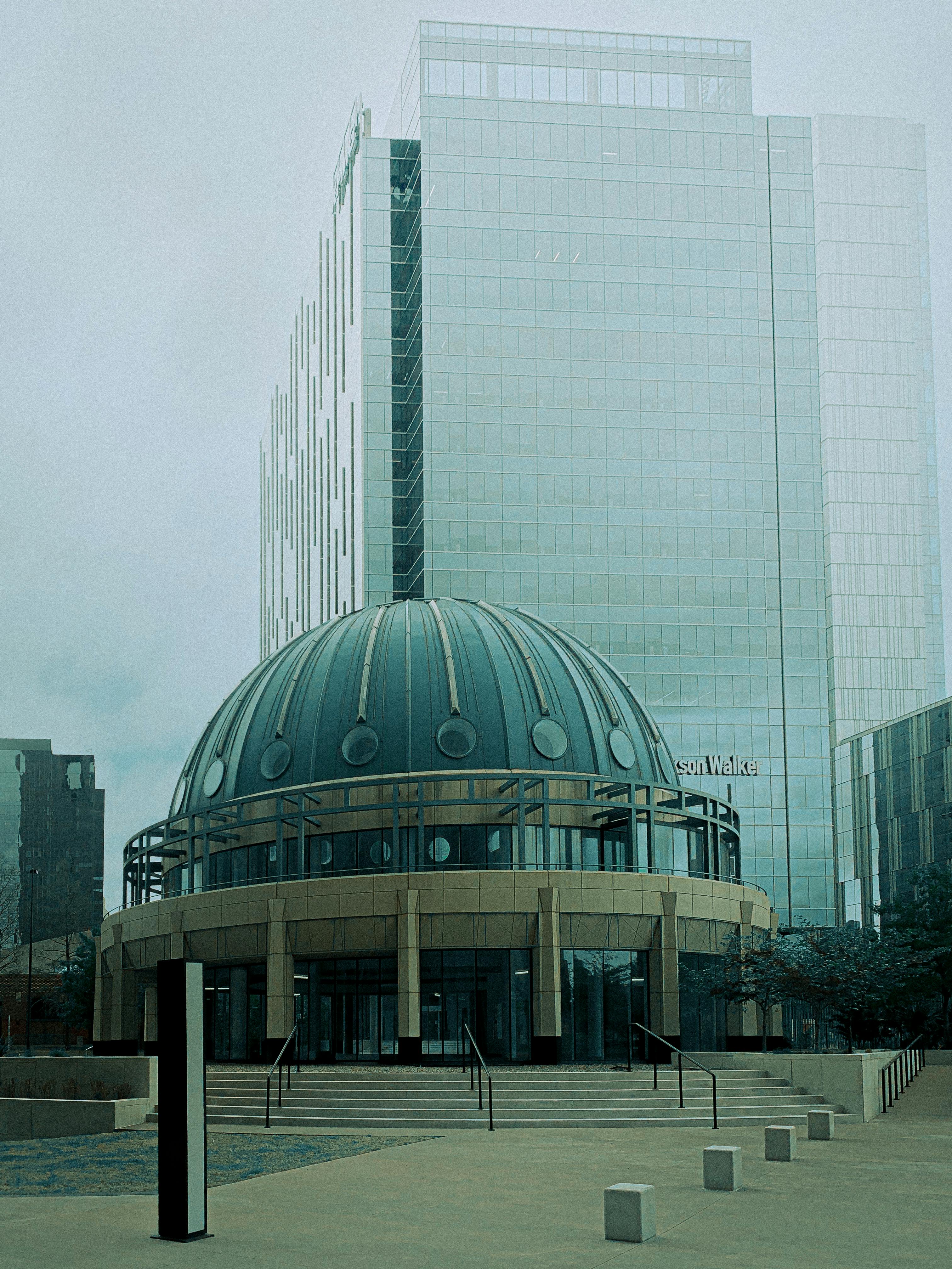 Dome in Front of Skyscraper · Free Stock Photo