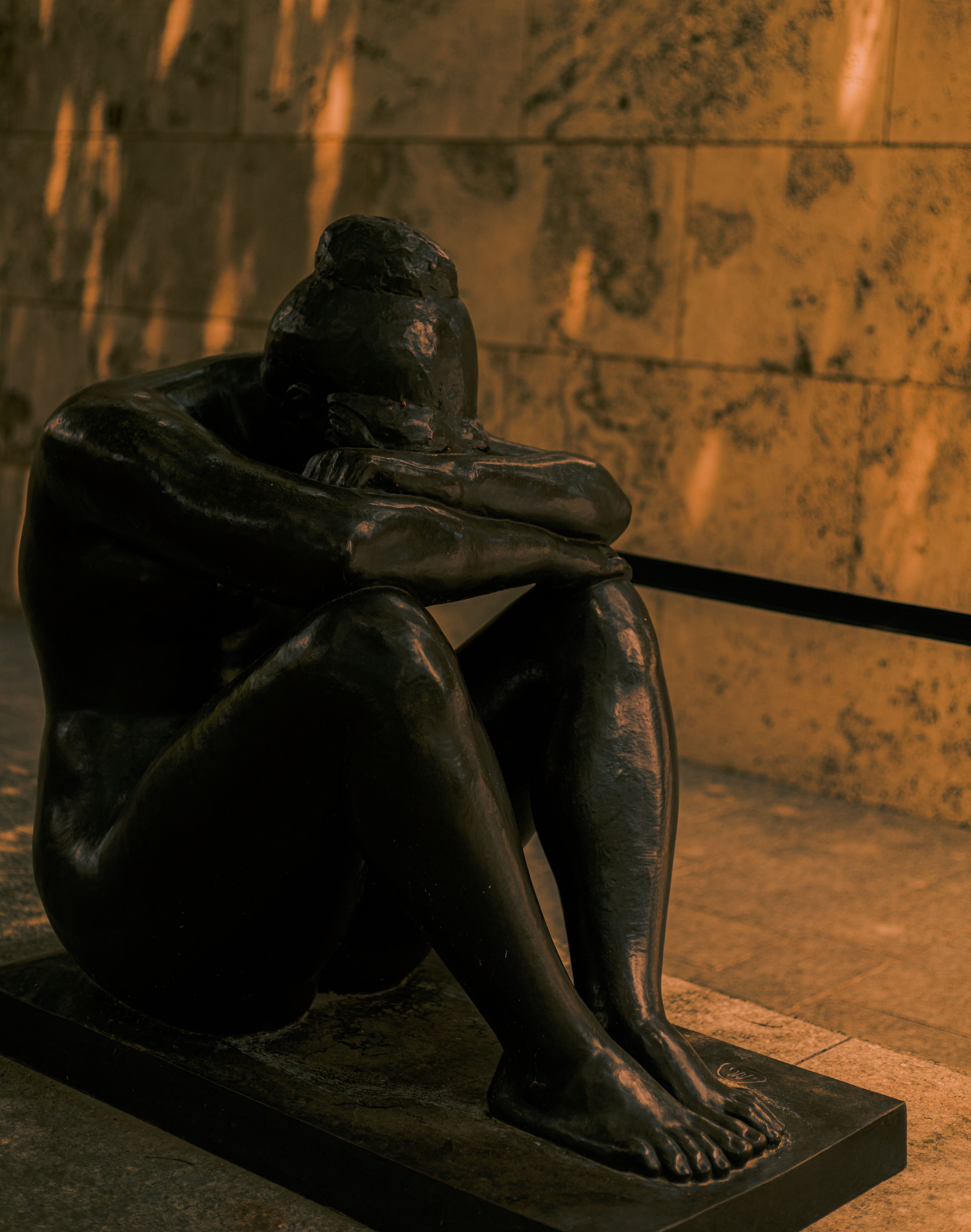 Sculpture of Person Covering Head with Hands · Free Stock Photo
