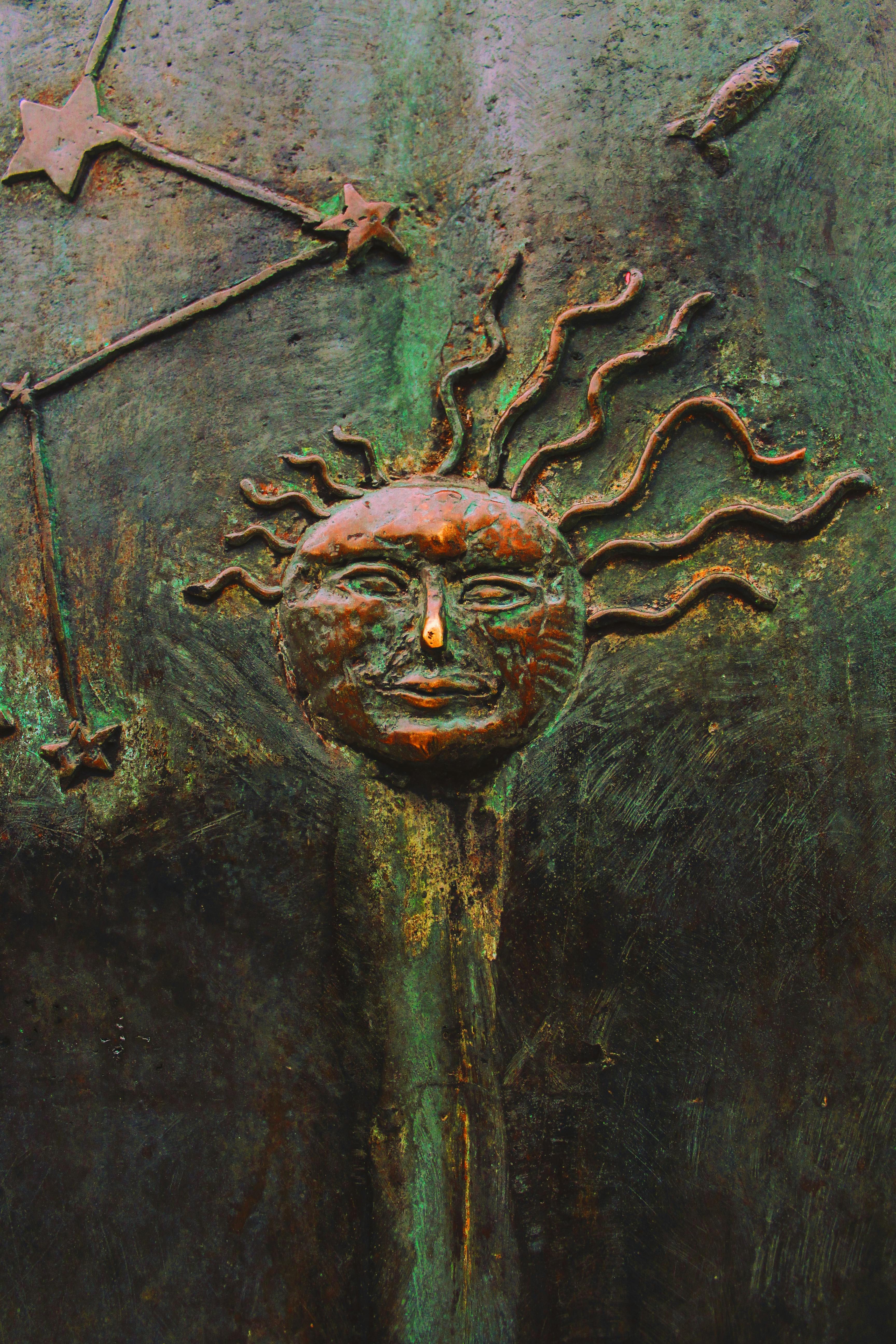 Sun Carved in Bronze · Free Stock Photo