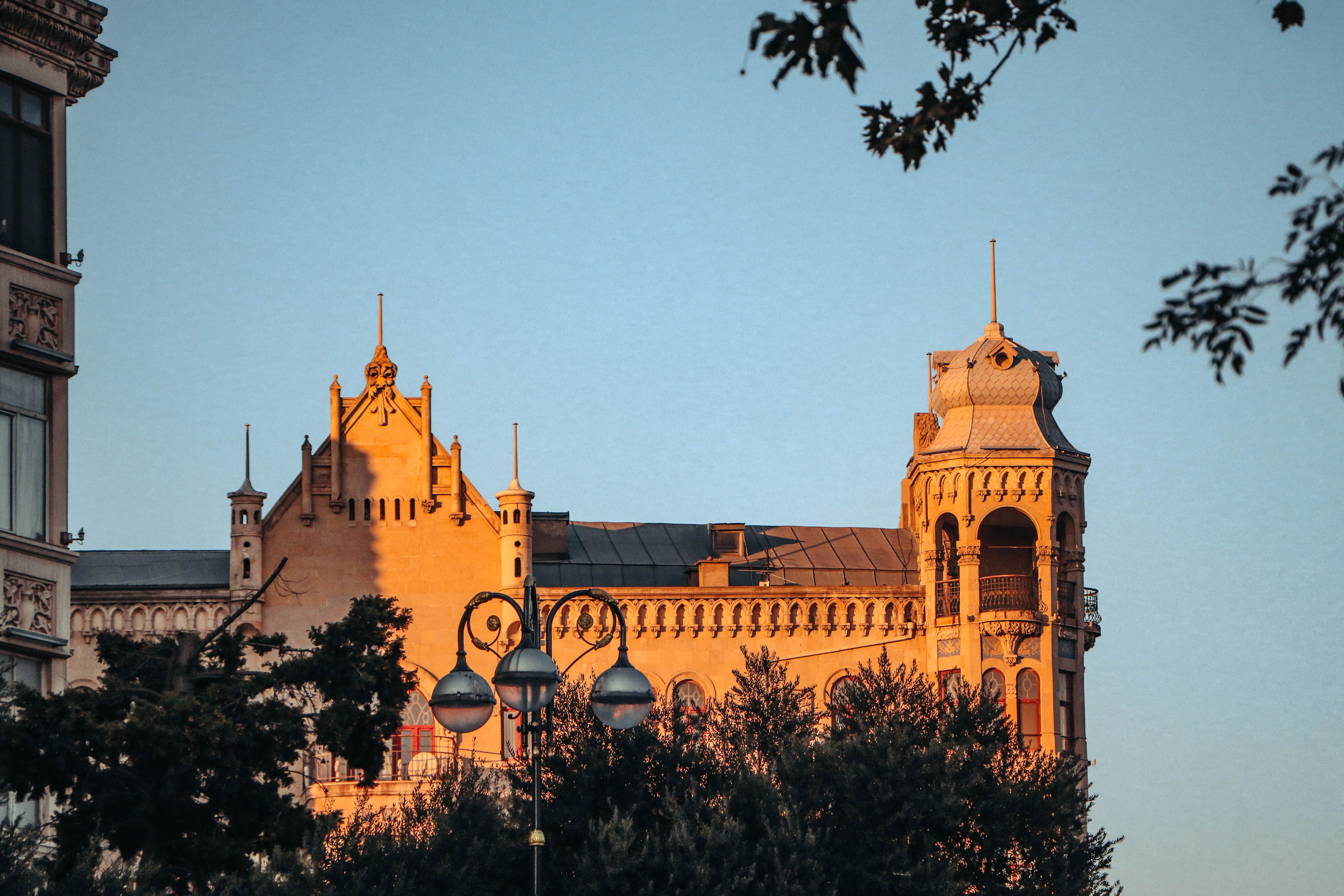 Baroque Historic Castle on Blue Sky on Sunset · Free Stock Photo