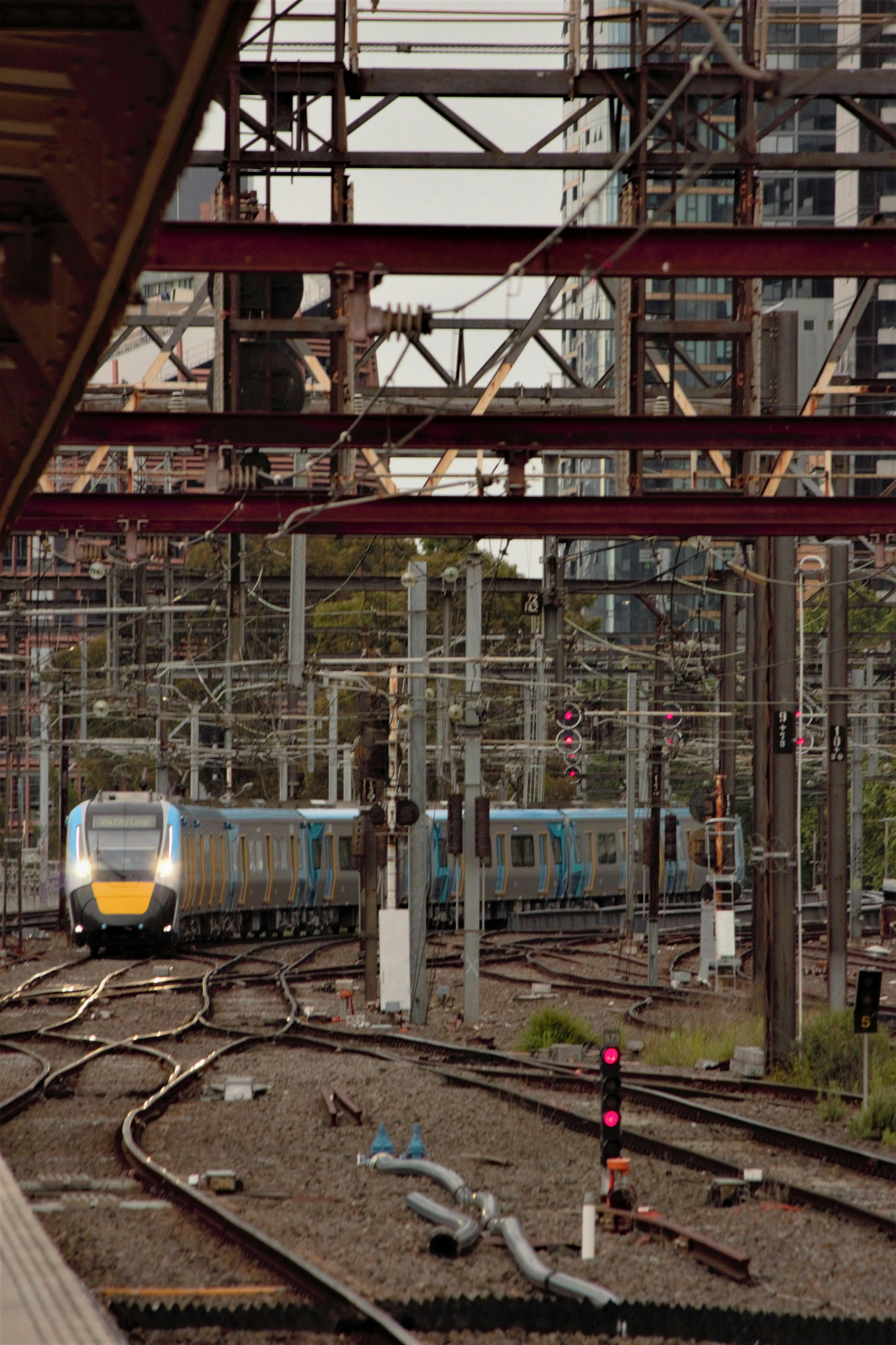 Mumbai Local Train on Railway Tracks · Free Stock Photo