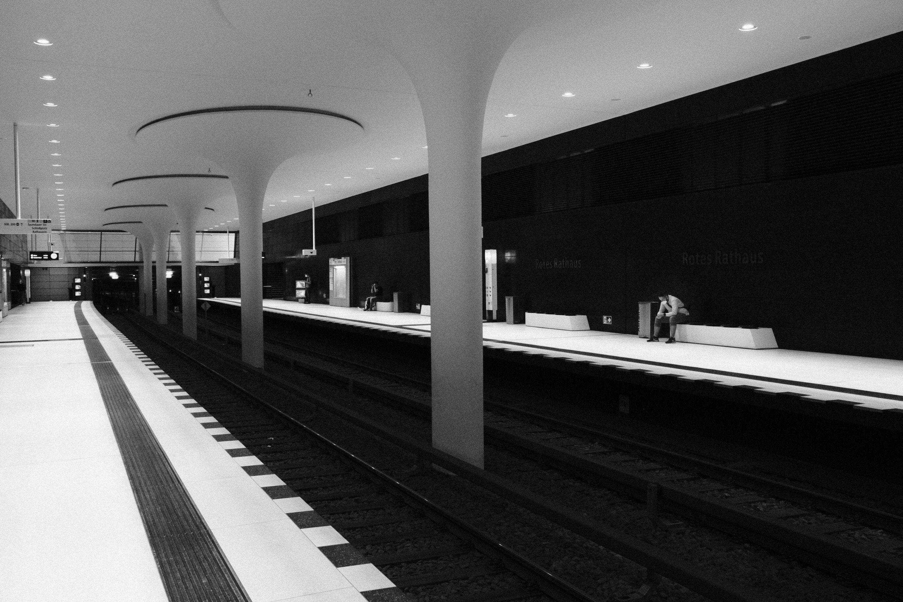 Woman in Trench Coat at Metro Station in Hannover · Free Stock Photo