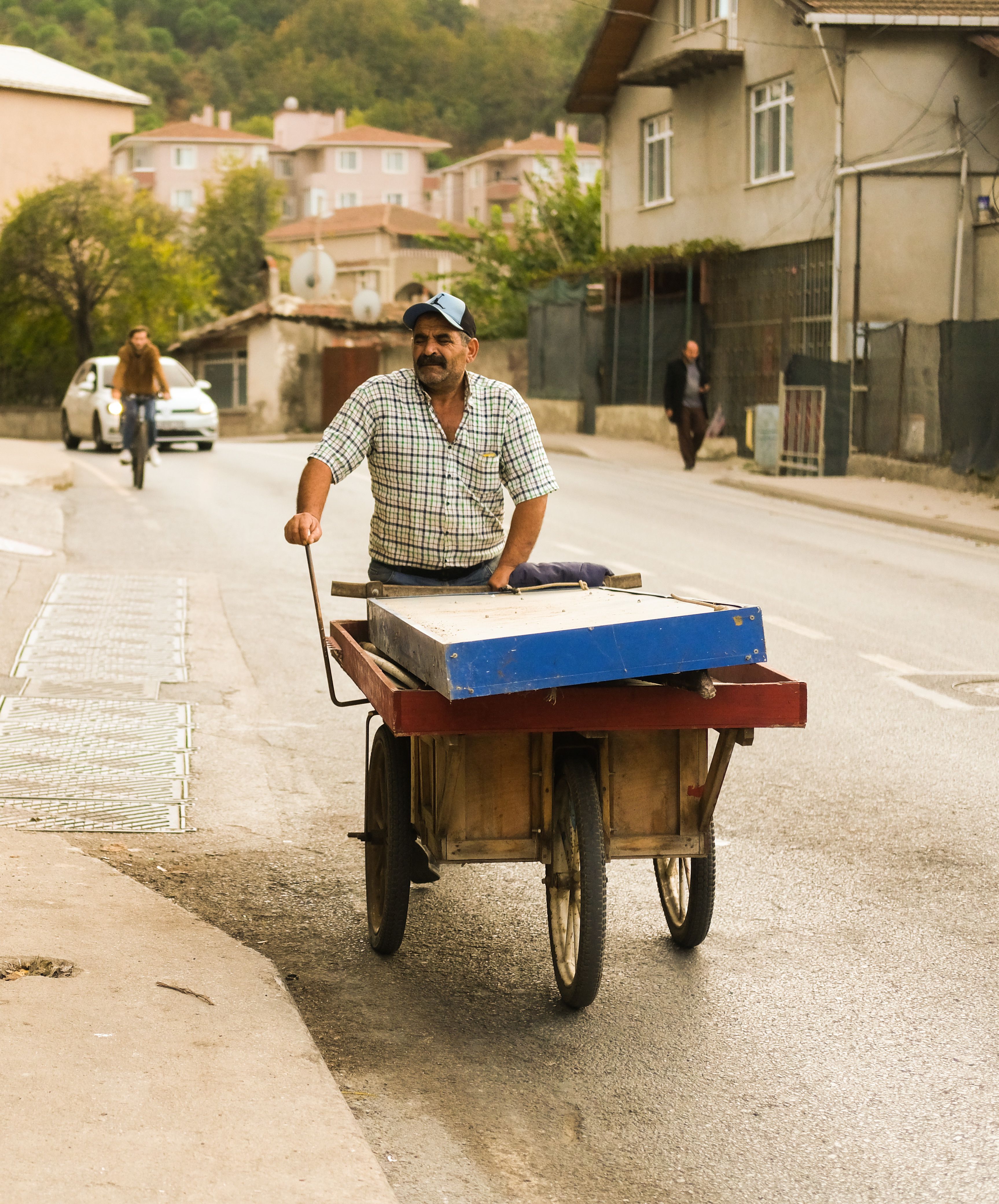 Man with Cart on Street · Free Stock Photo