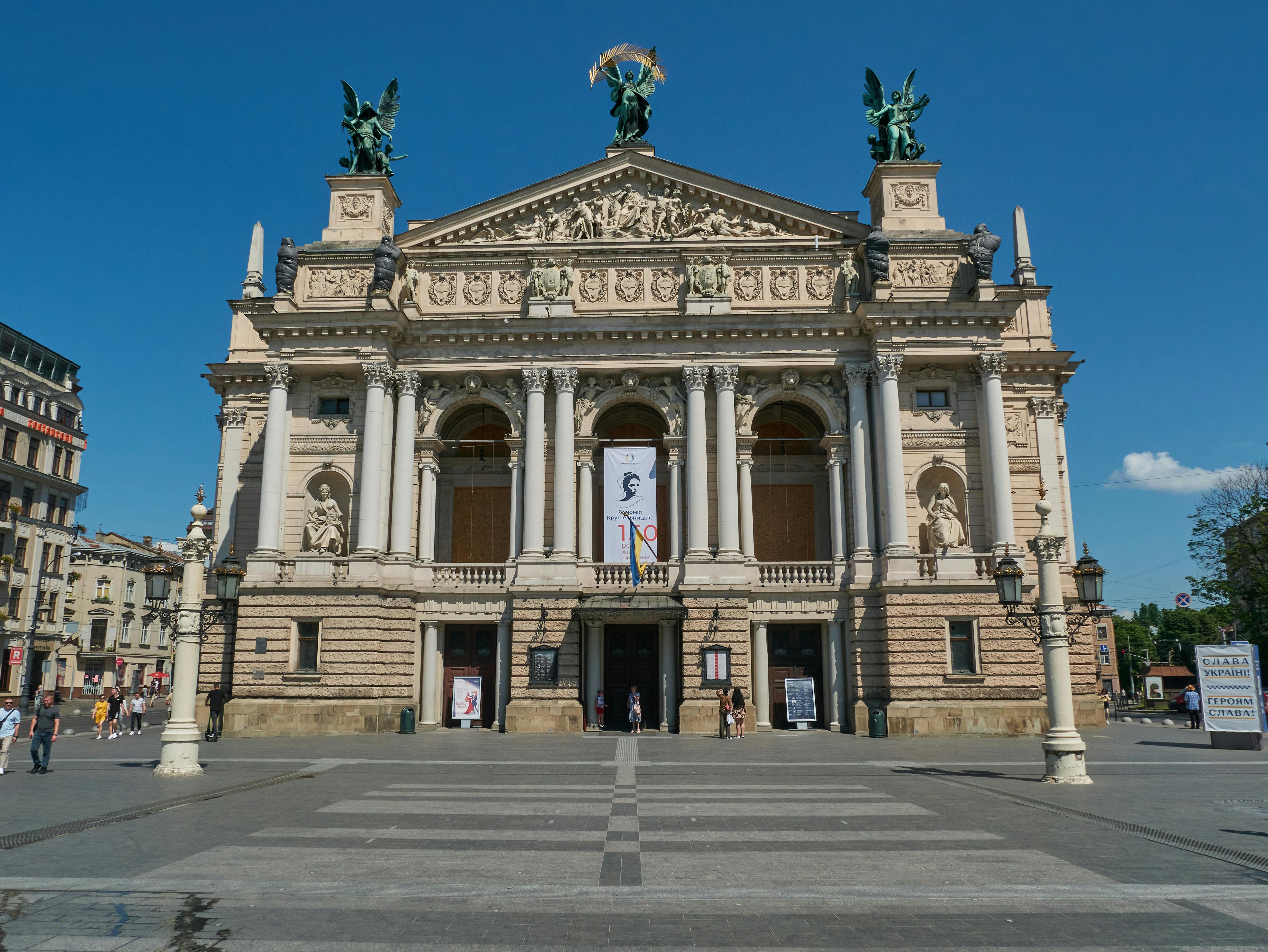 White and Red Concrete Building · Free Stock Photo