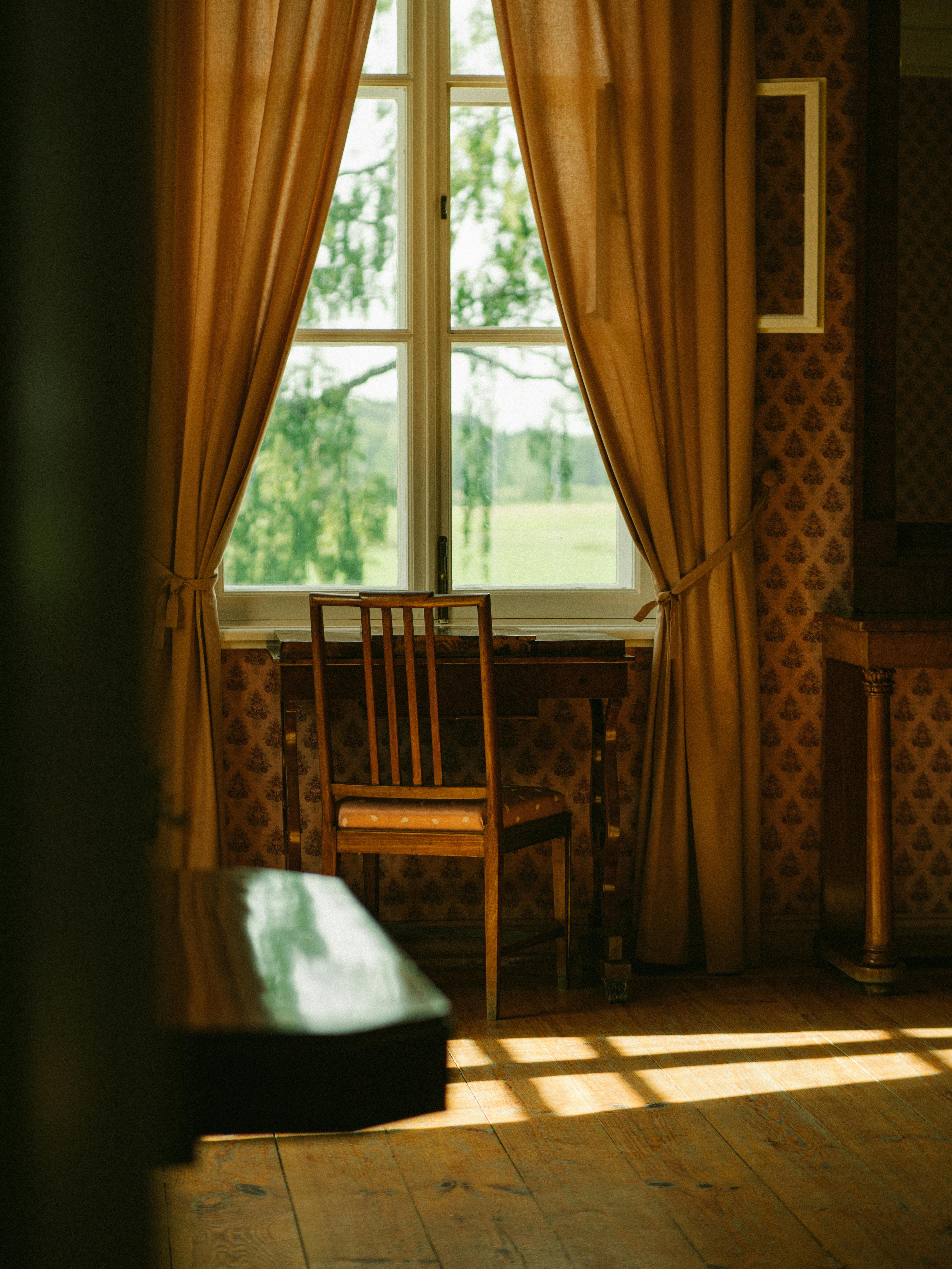 Brown Wooden Chair Near Window · Free Stock Photo