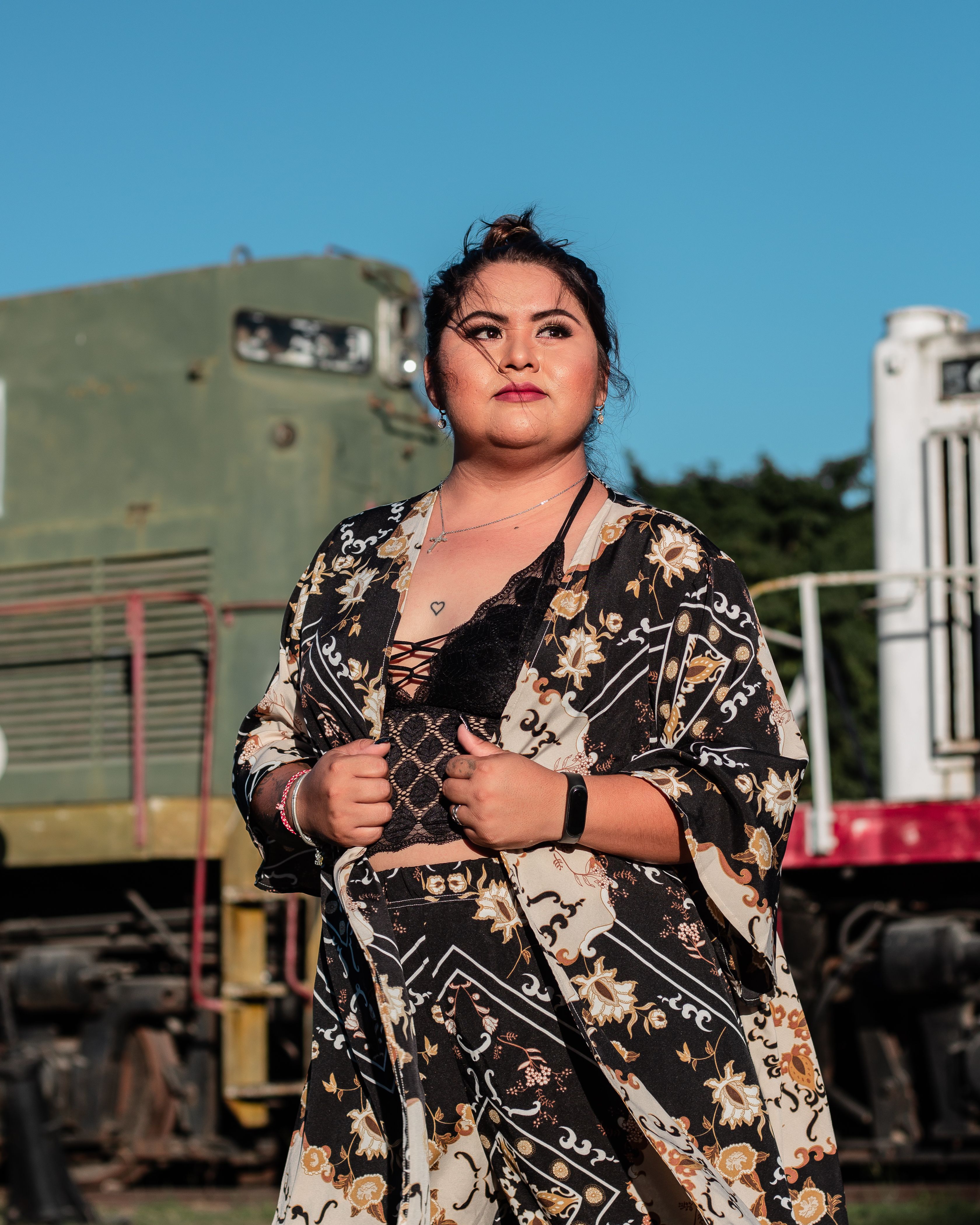 Plus Size Model in Patterned Outfit · Free Stock Photo