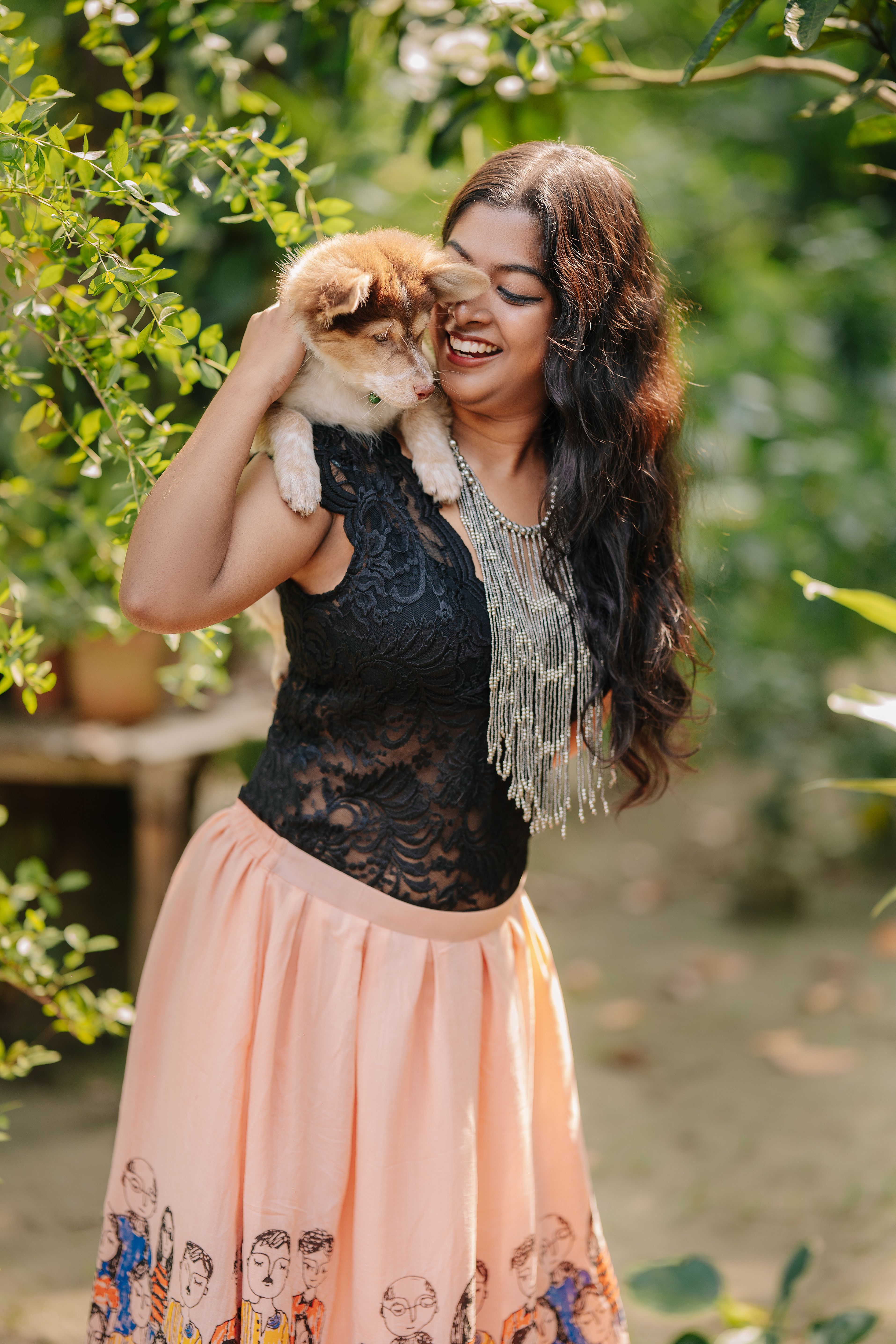 Woman Carrying her Dog · Free Stock Photo