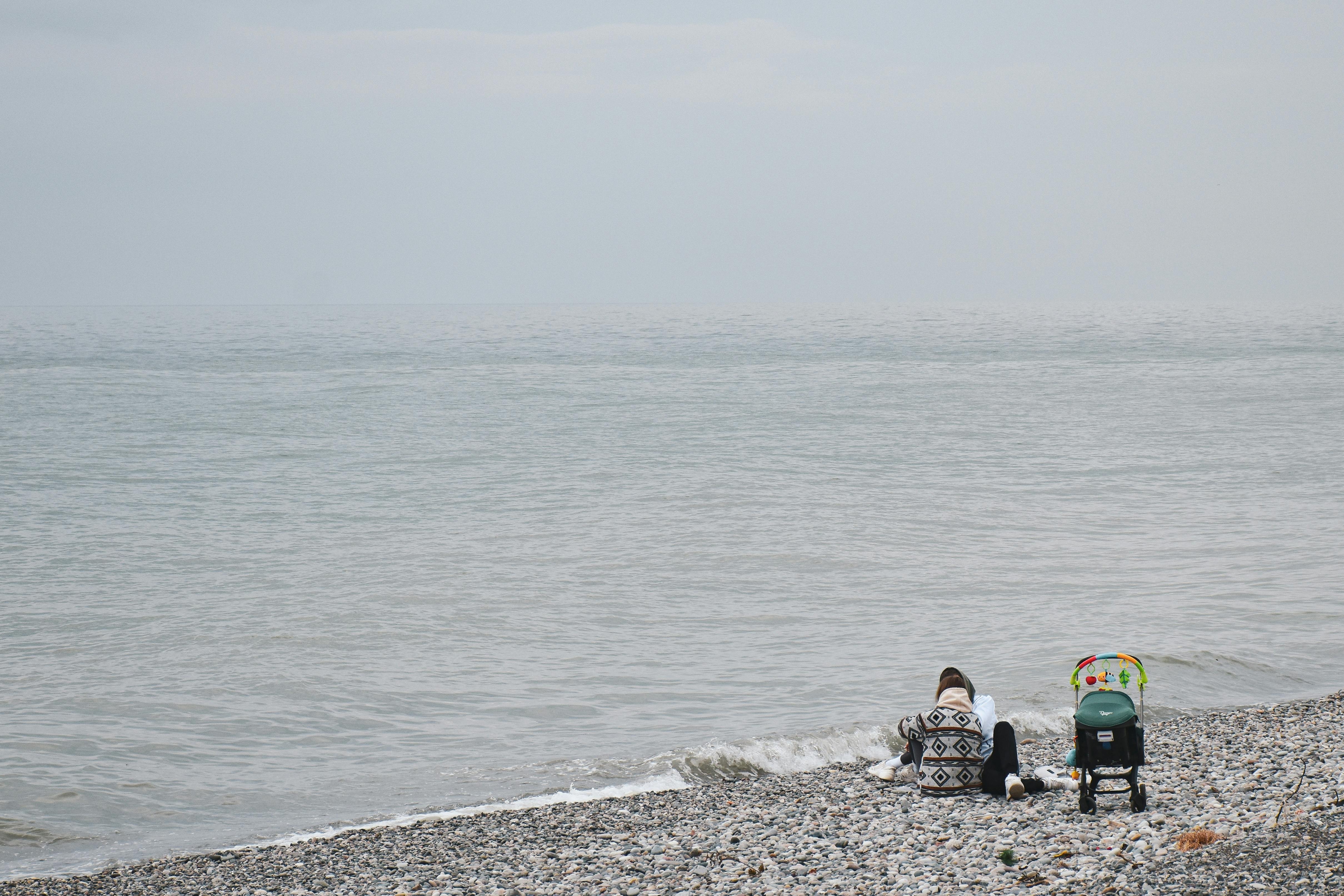 Boys on a Rocky Shore · Free Stock Photo