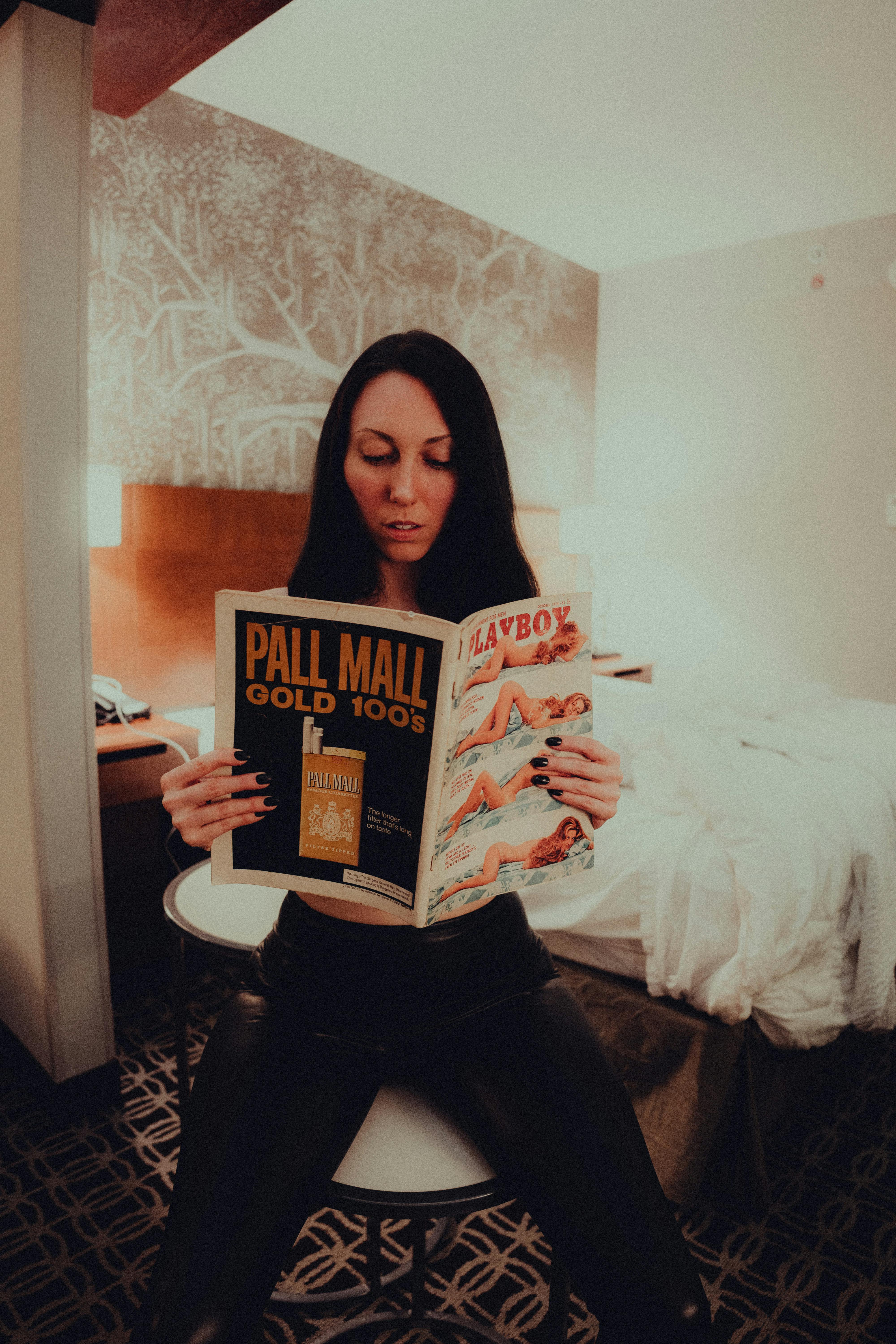 Woman Reading Vogue Magazine after Bath · Free Stock Photo