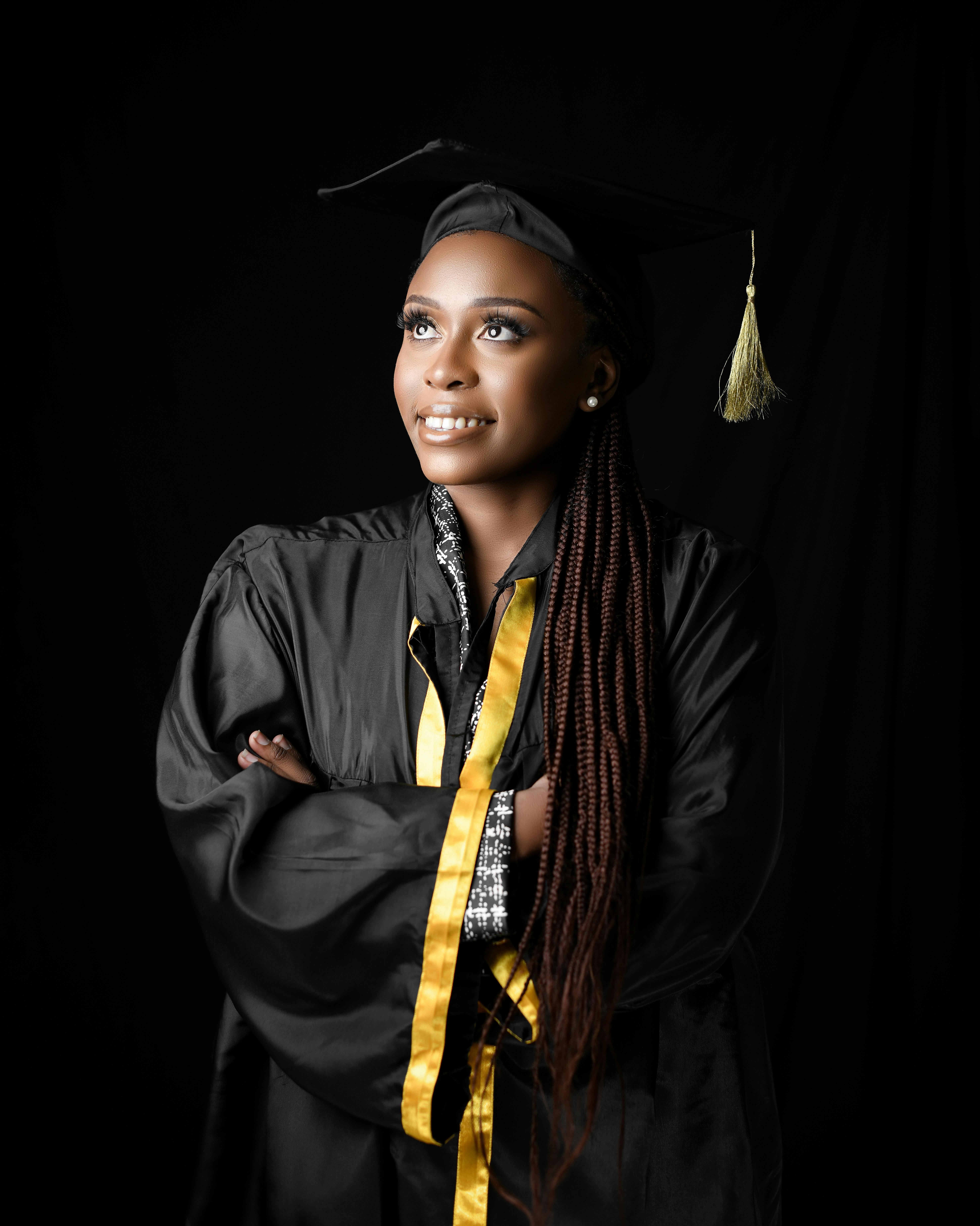 Woman Wearing Graduation Clothing · Free Stock Photo