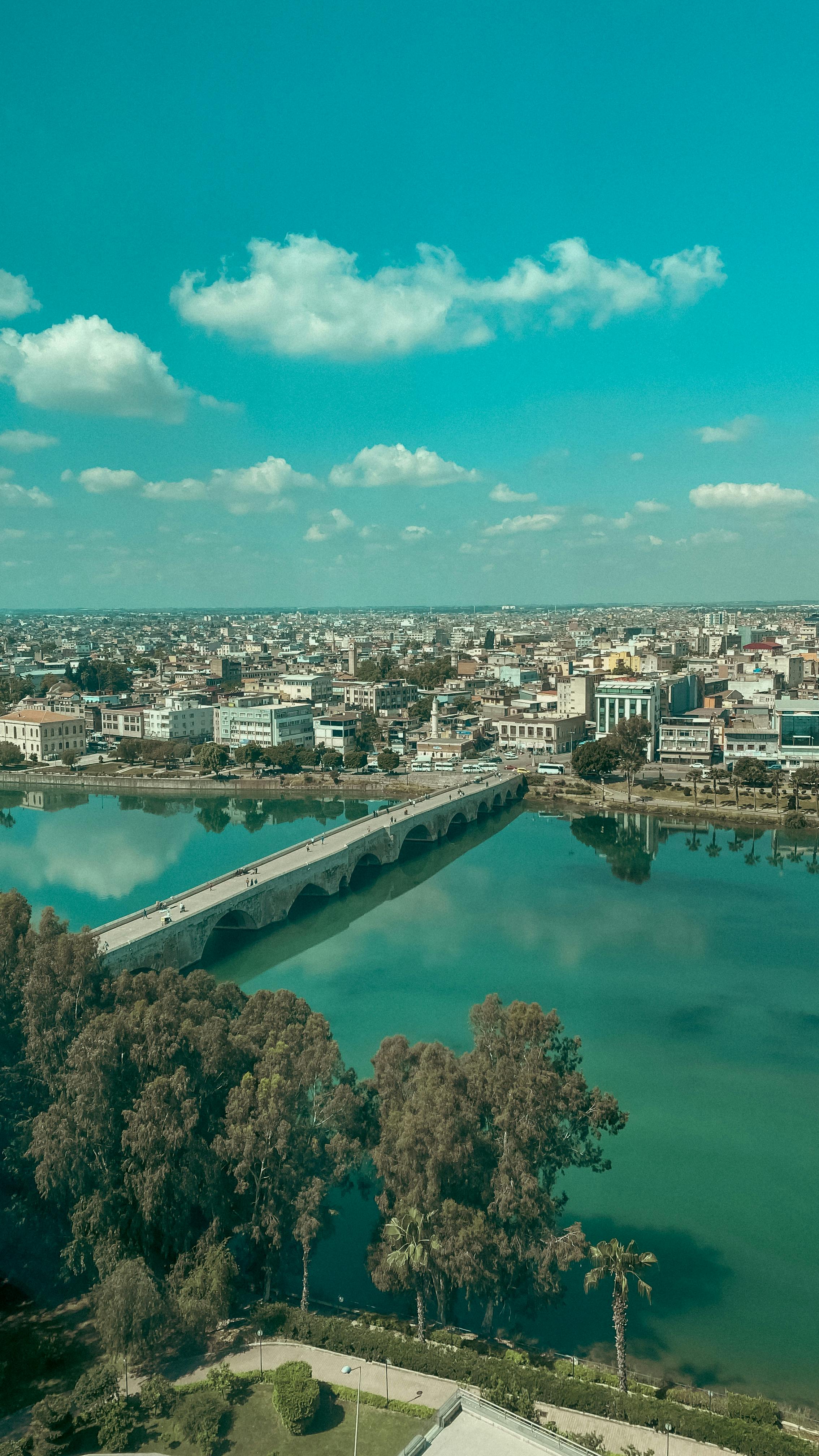 Aerial View of City on River Bank · Free Stock Photo