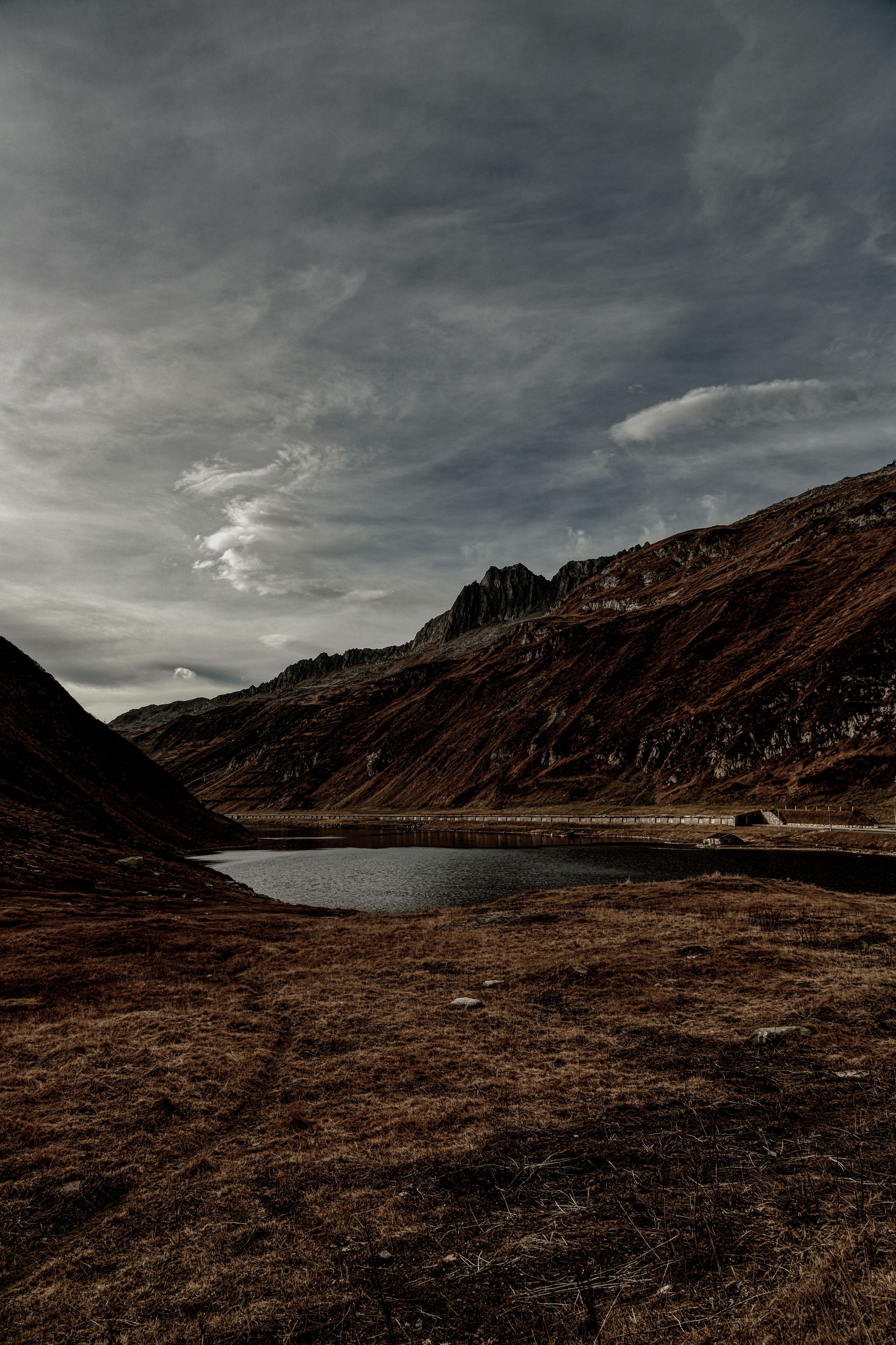 Mountains under Storm Clouds · Free Stock Photo