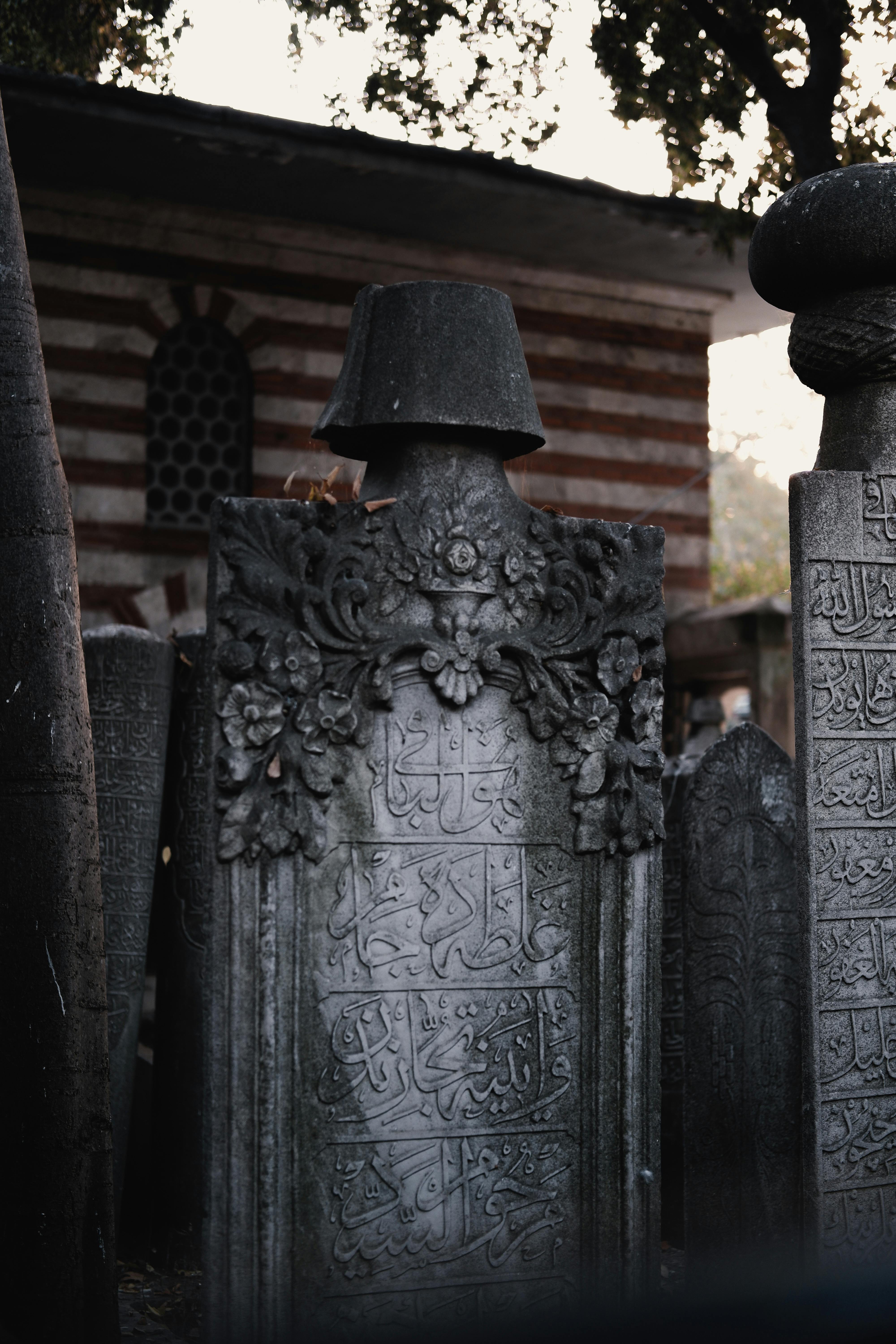 Photo of a Tombstone on an Islamic Cemetery · Free Stock Photo