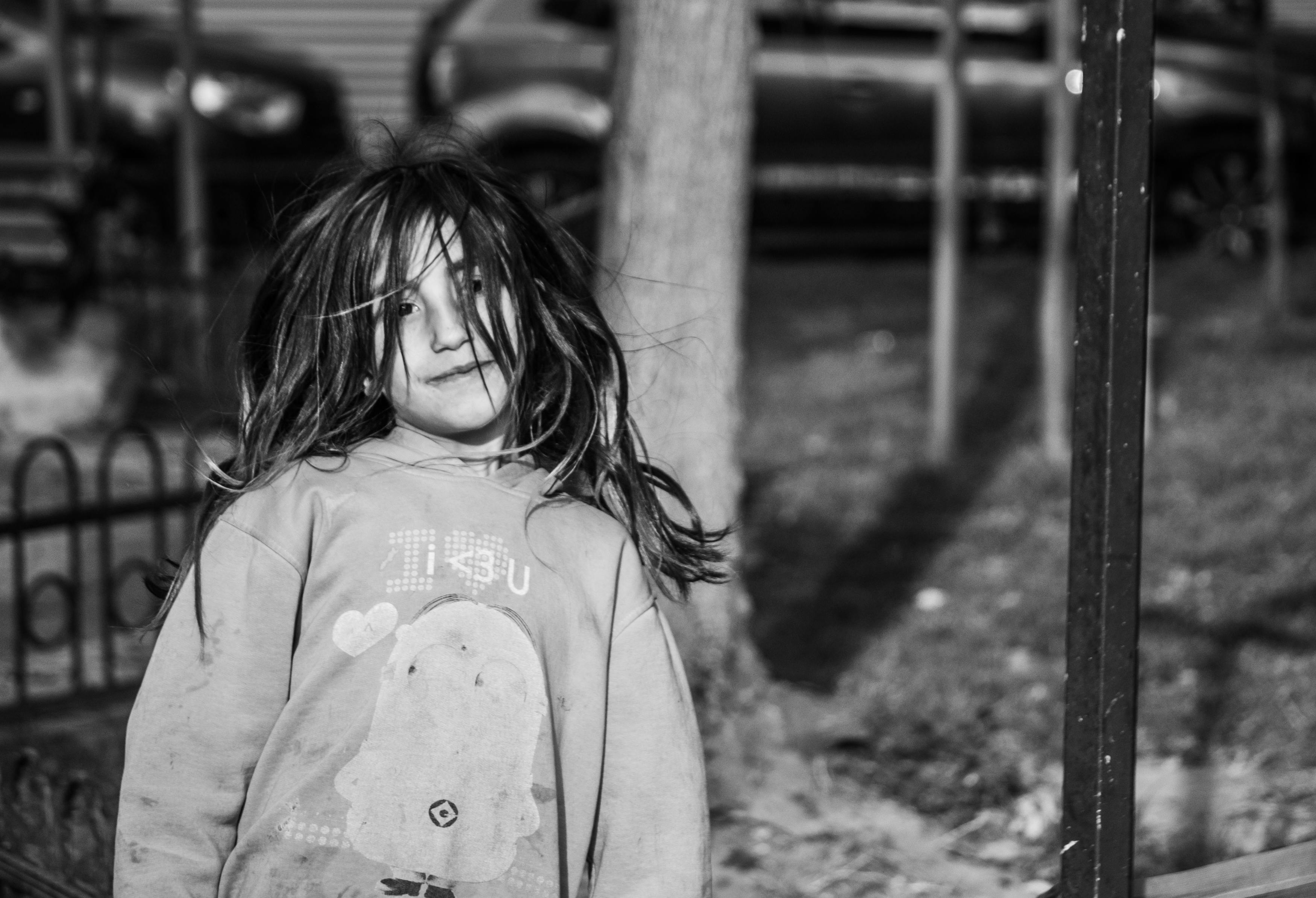 Grayscale Photo of a Kid Standing Beside a Drinking Fountain · Free ...