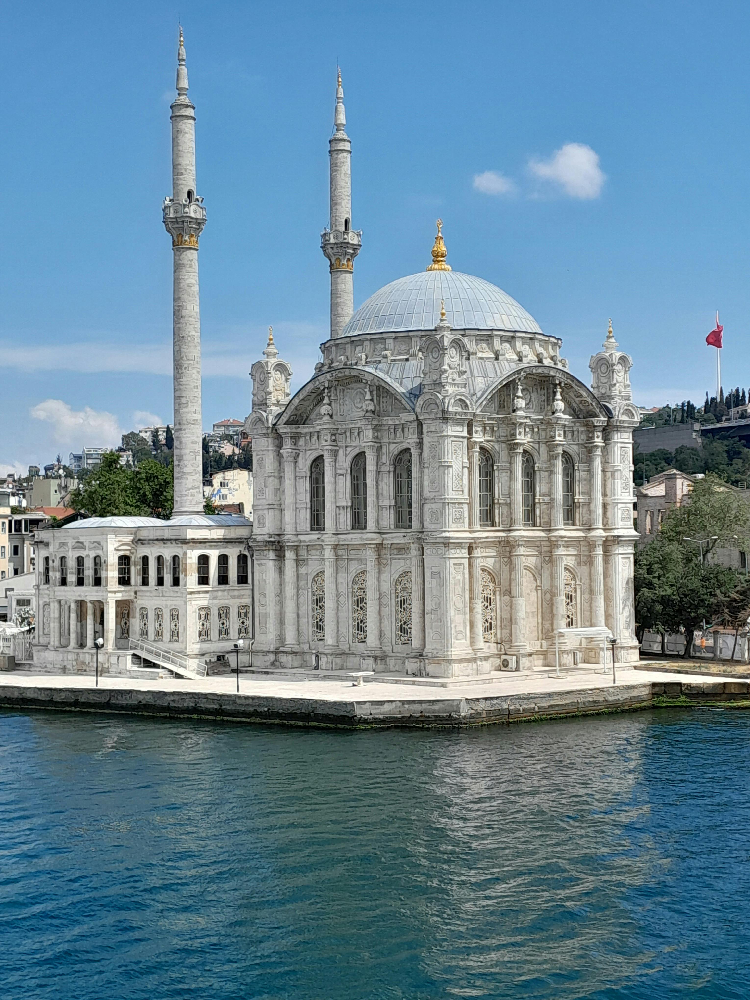 Grand Mecidiye Mosque Near a Lake Under Blue Sky · Free Stock Photo