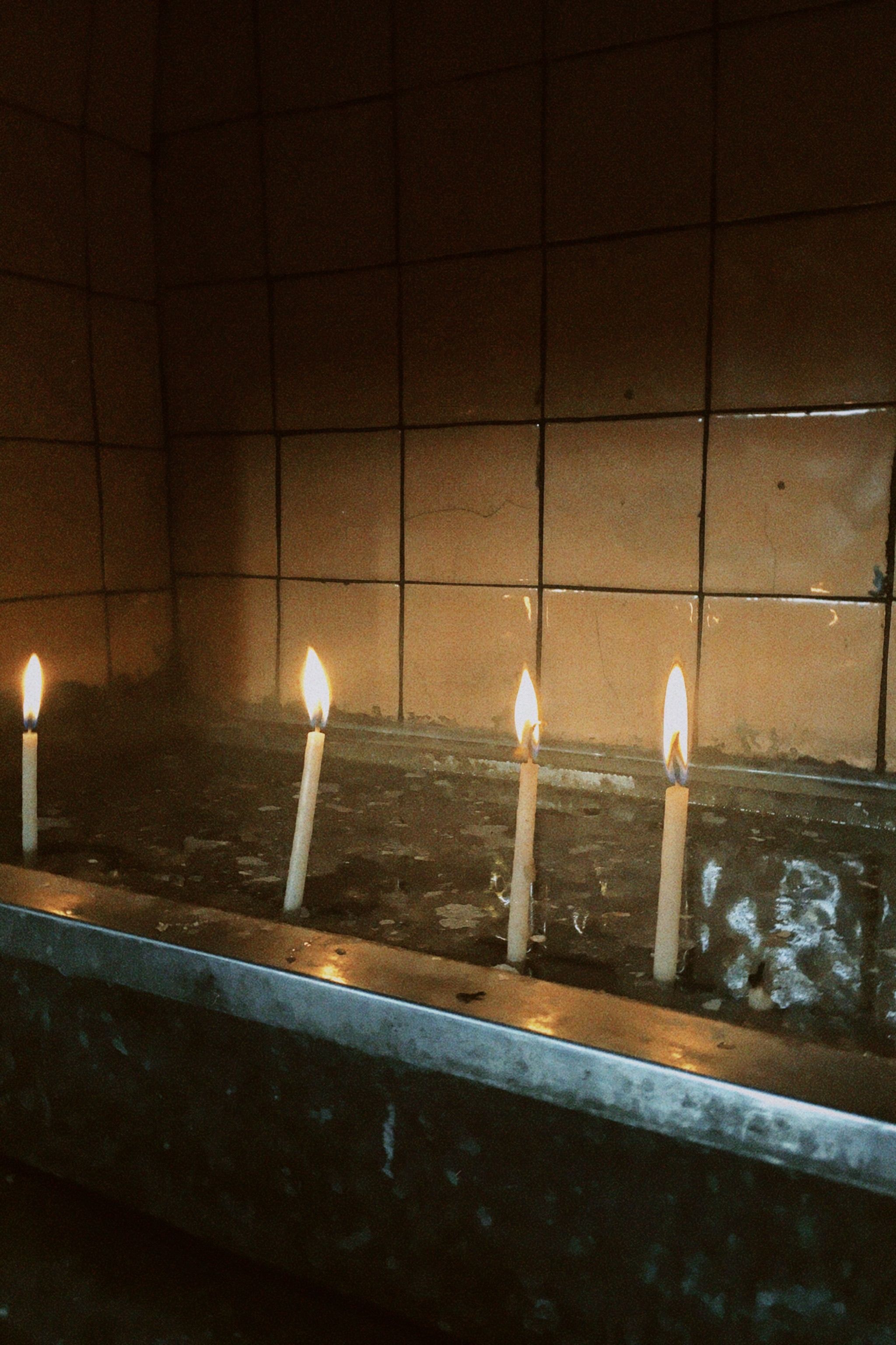 Lighted Candles in Close-up Photography · Free Stock Photo