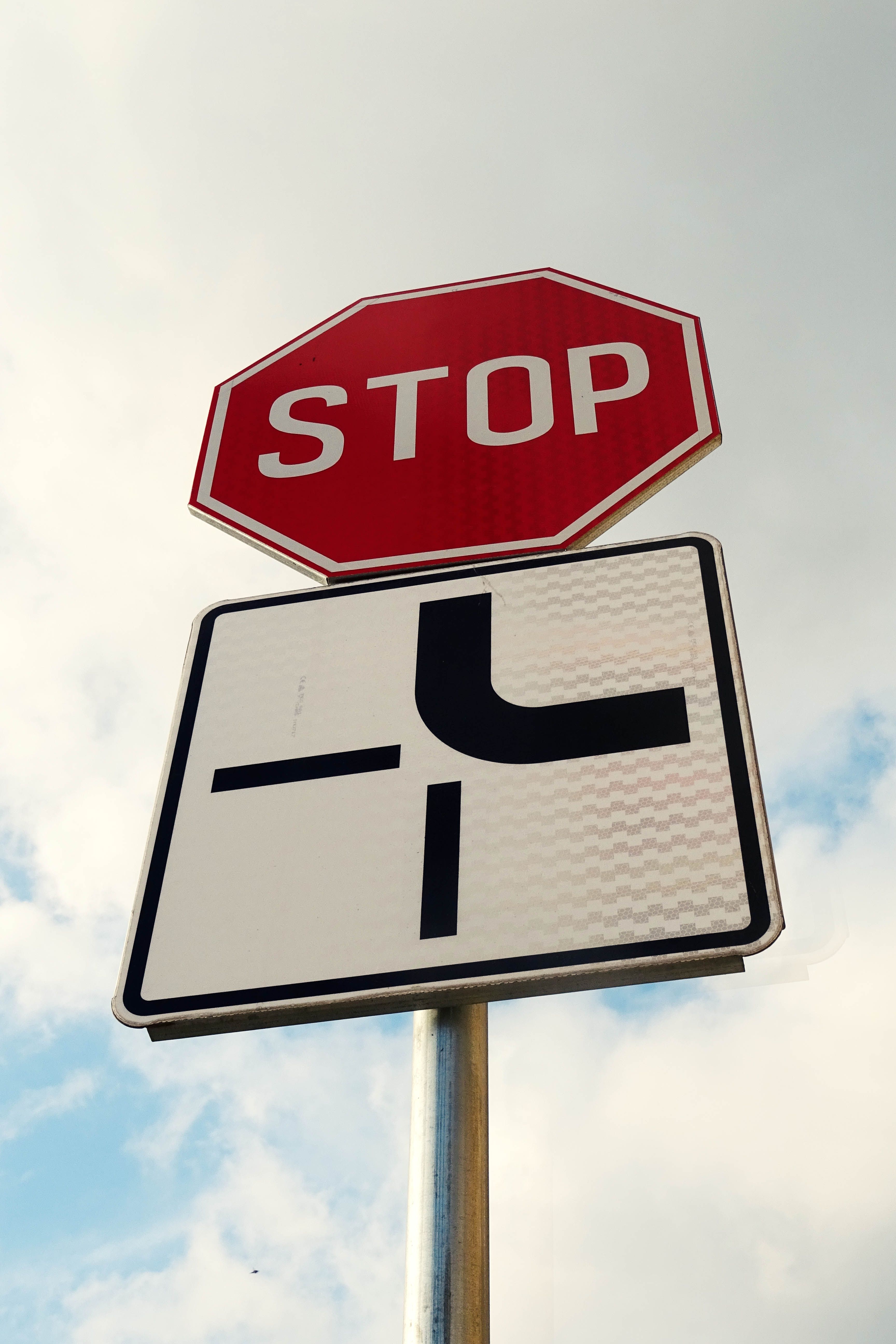 Red Signage on Fuel Pump · Free Stock Photo