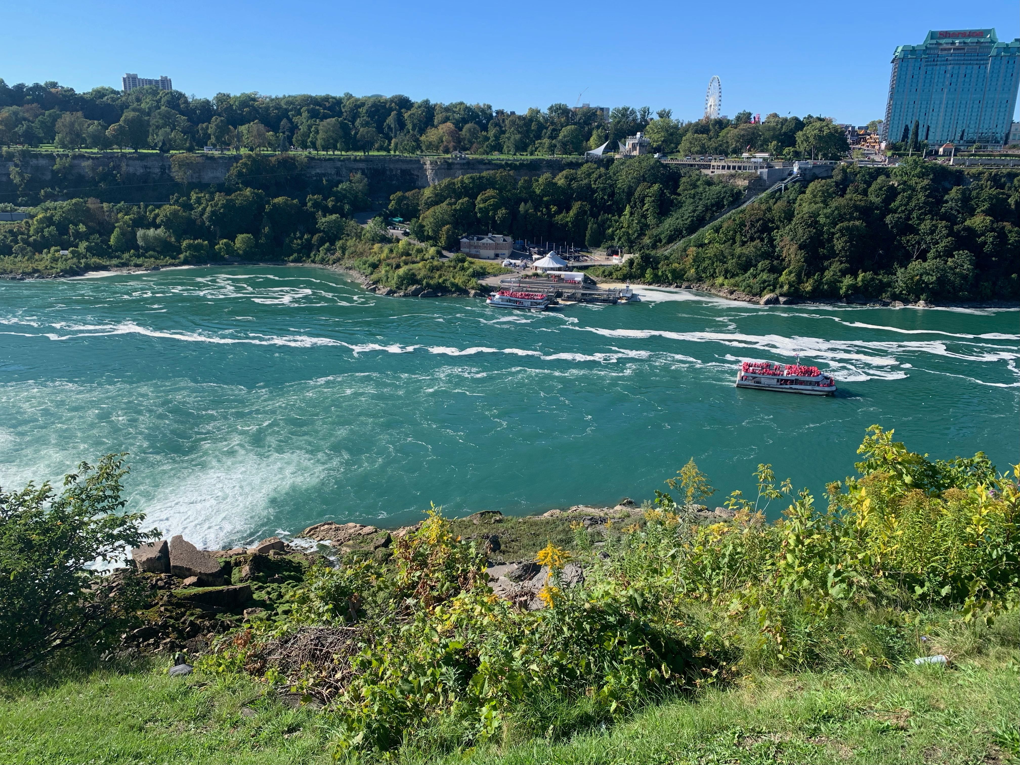 Ferries on River near Town · Free Stock Photo