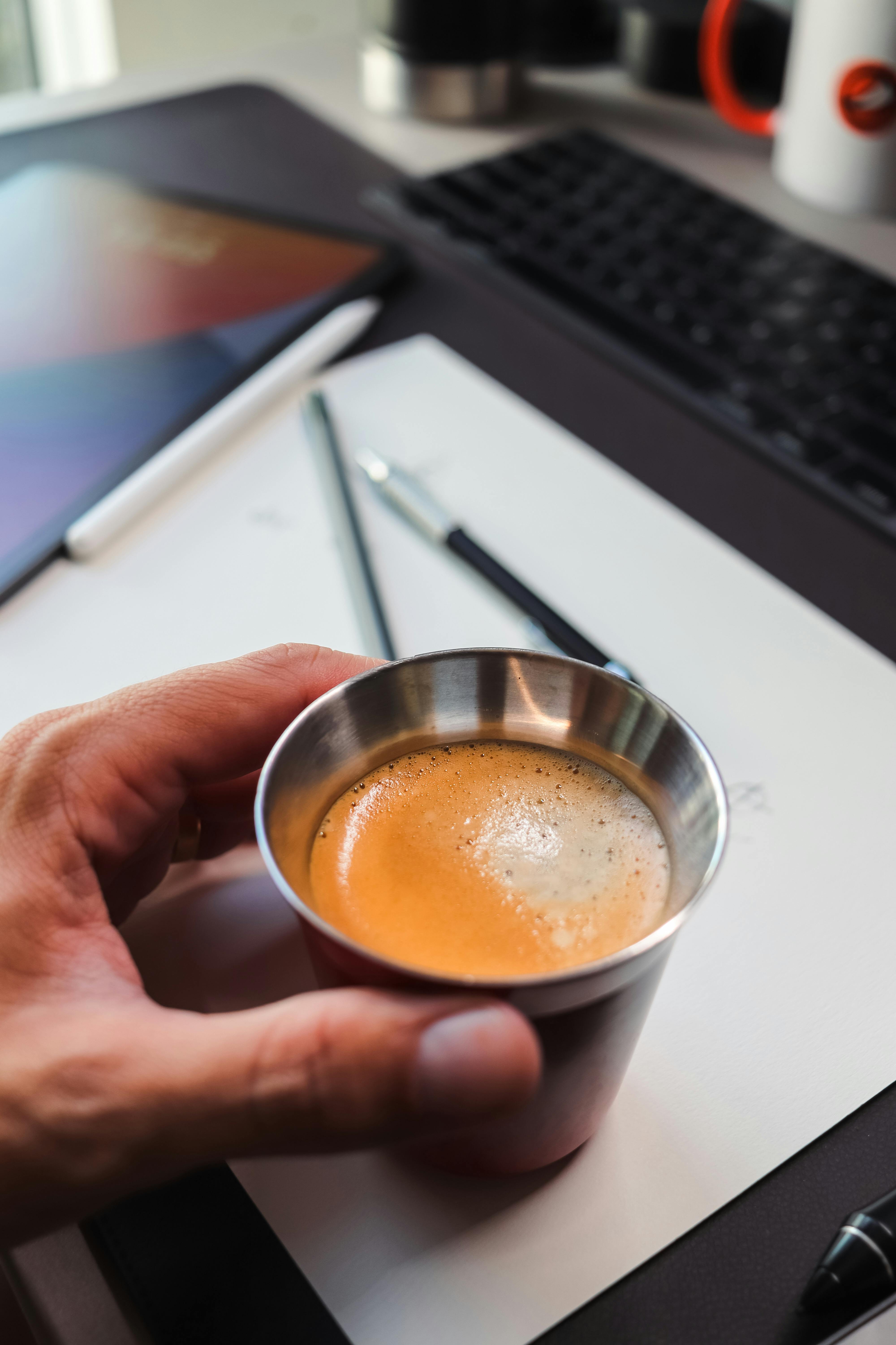 Close-Up Shot of a Person Making Coffee · Free Stock Photo
