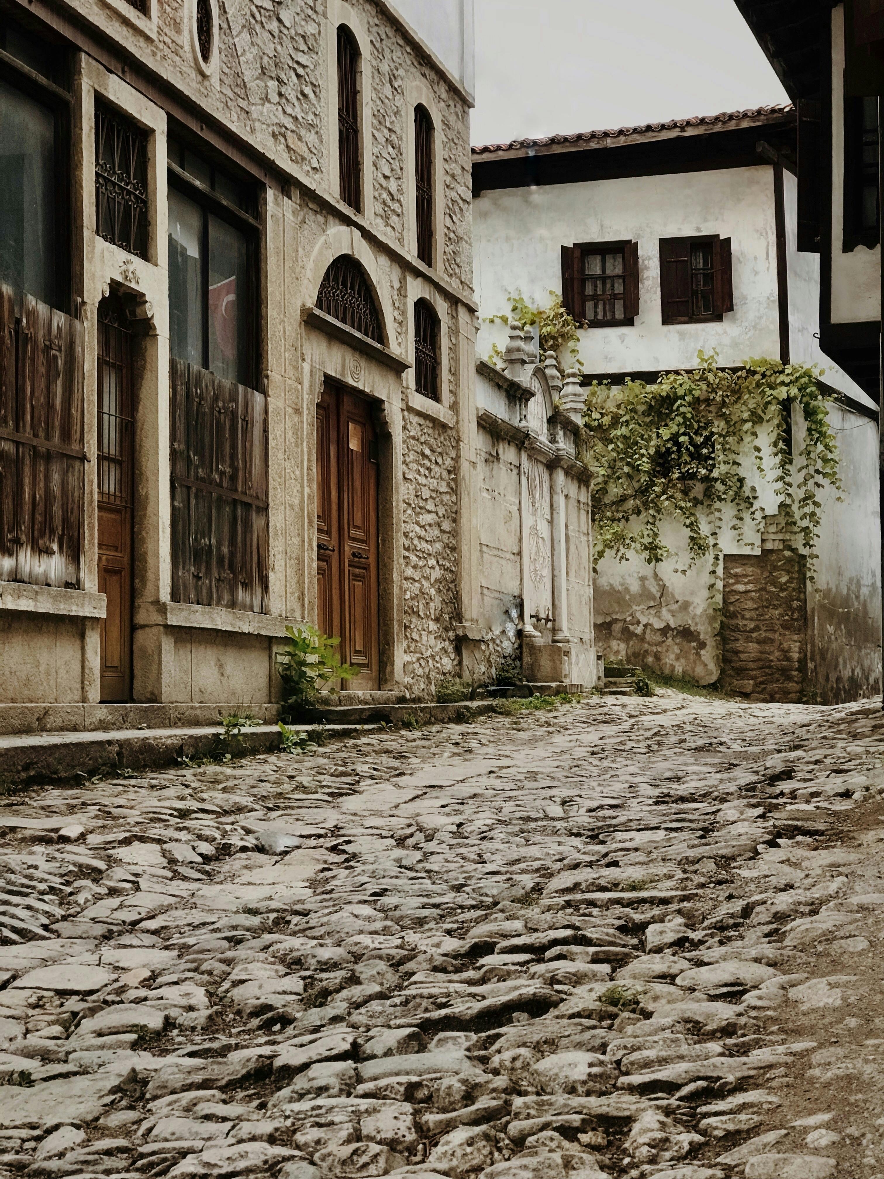 Broken Cobblestone on Alley in Town · Free Stock Photo