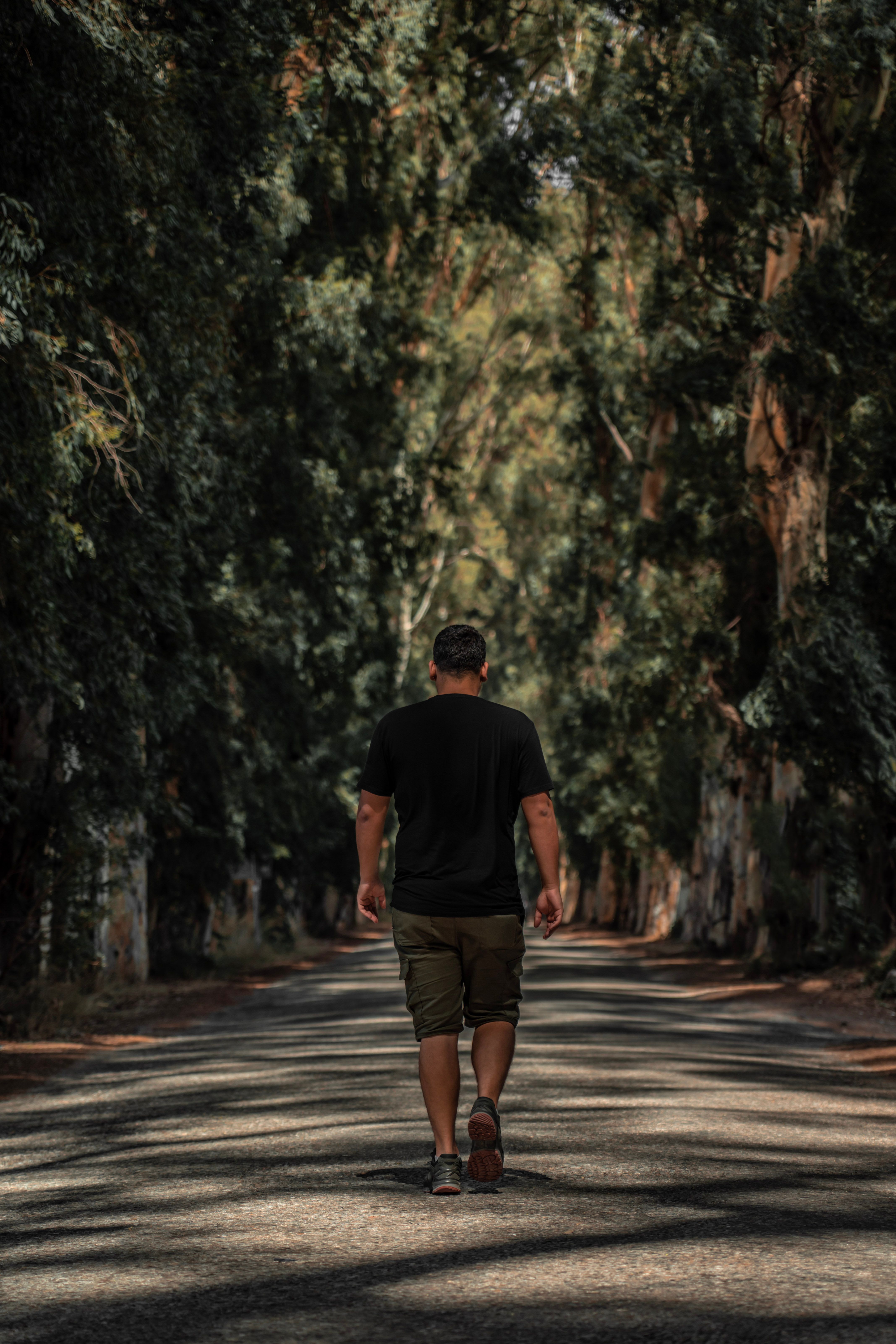 Photo of Men Walking Together · Free Stock Photo