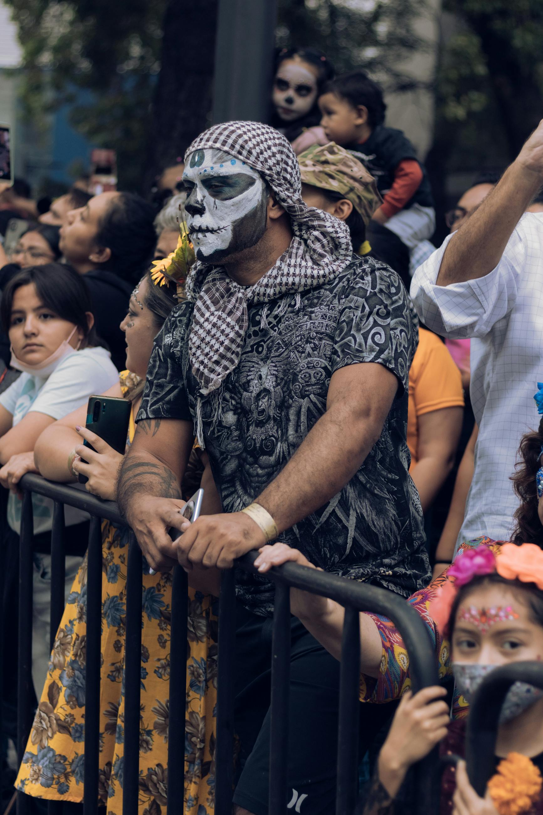 Woman in Santa Muerte Costume Holding Smoking Skull · Free Stock Photo