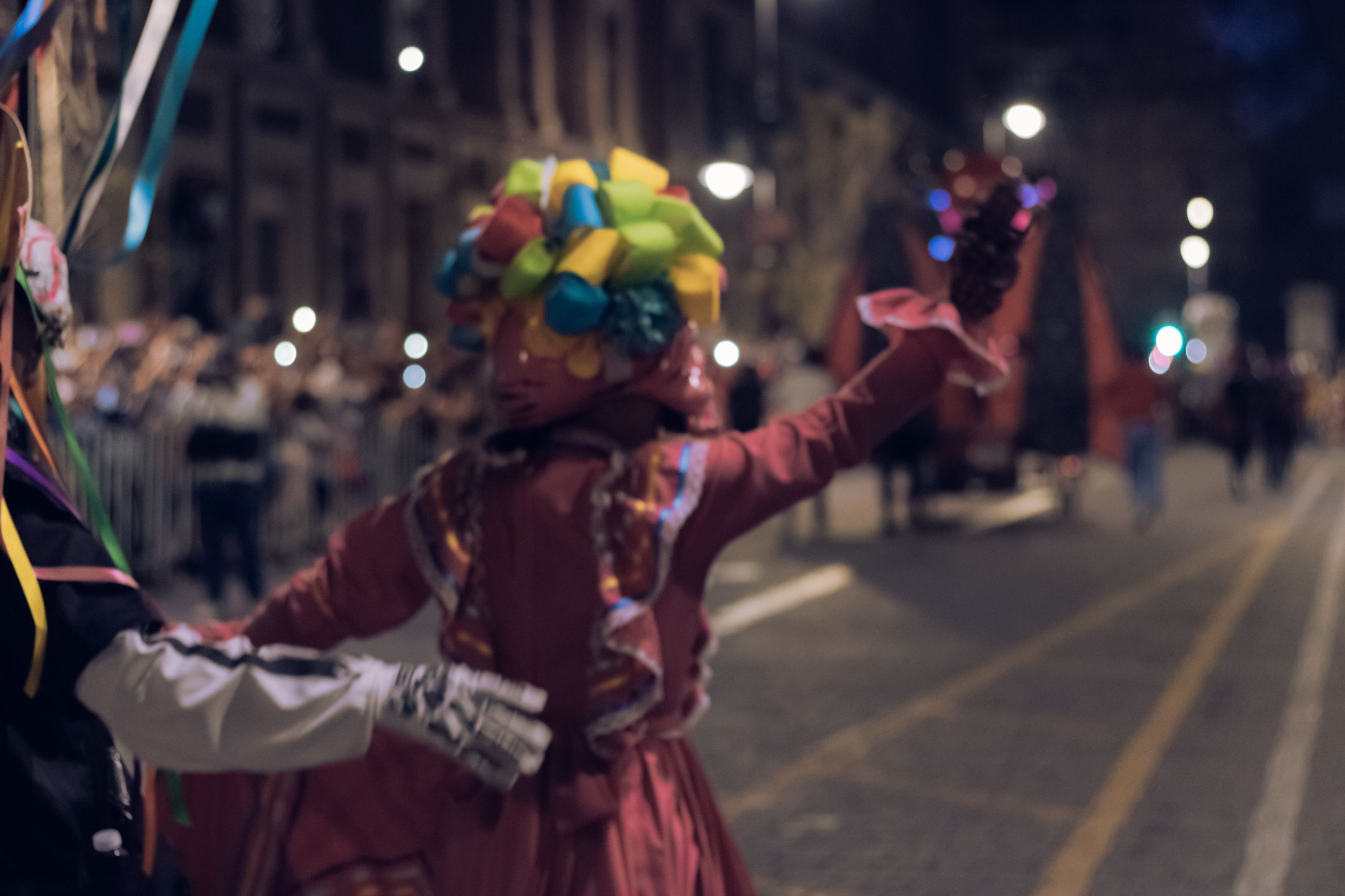 People Wearing Costumes in a Street Parade · Free Stock Photo