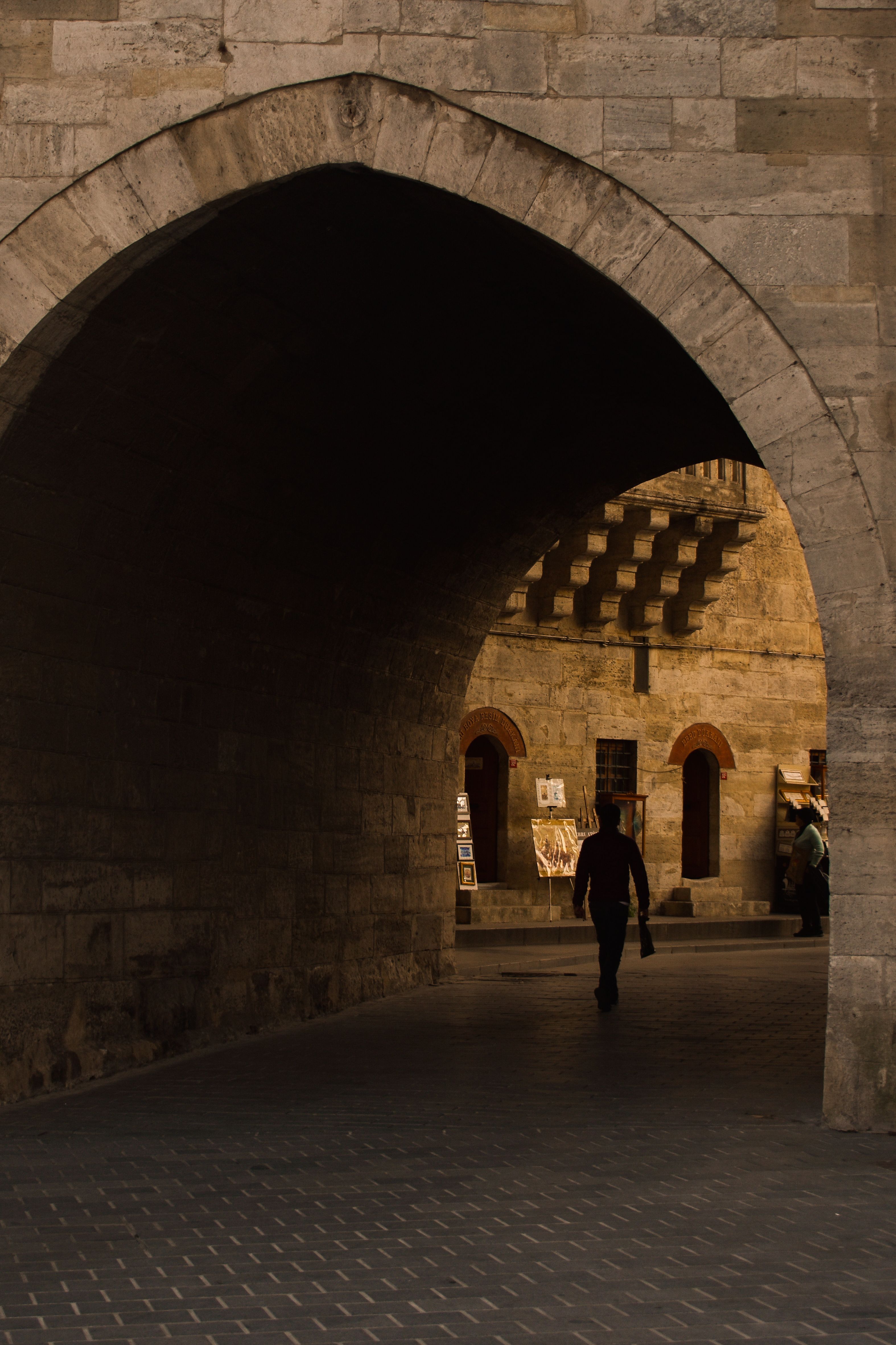 Person Walking Into Castle · Free Stock Photo
