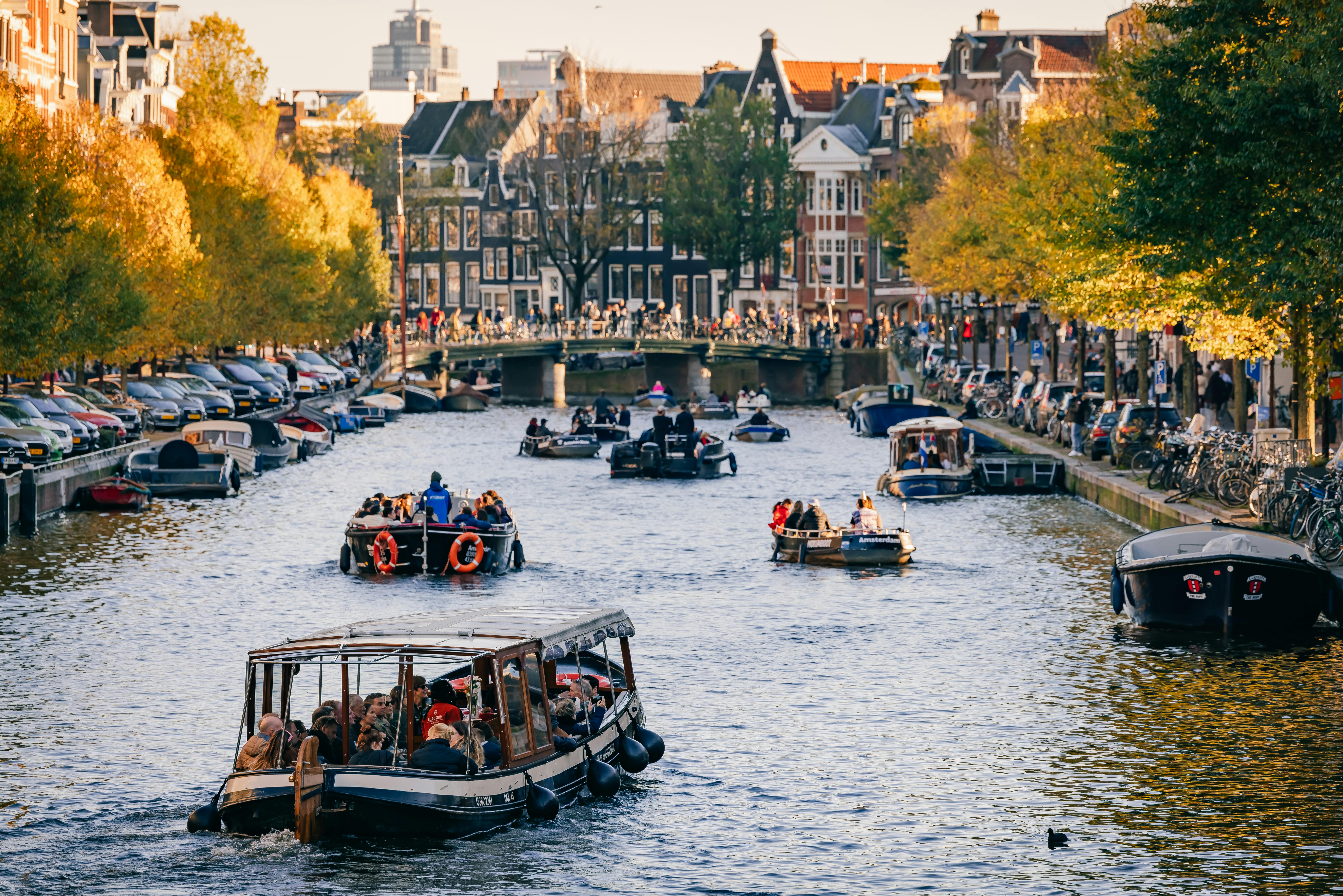People riding Boats on a Water Canal · Free Stock Photo