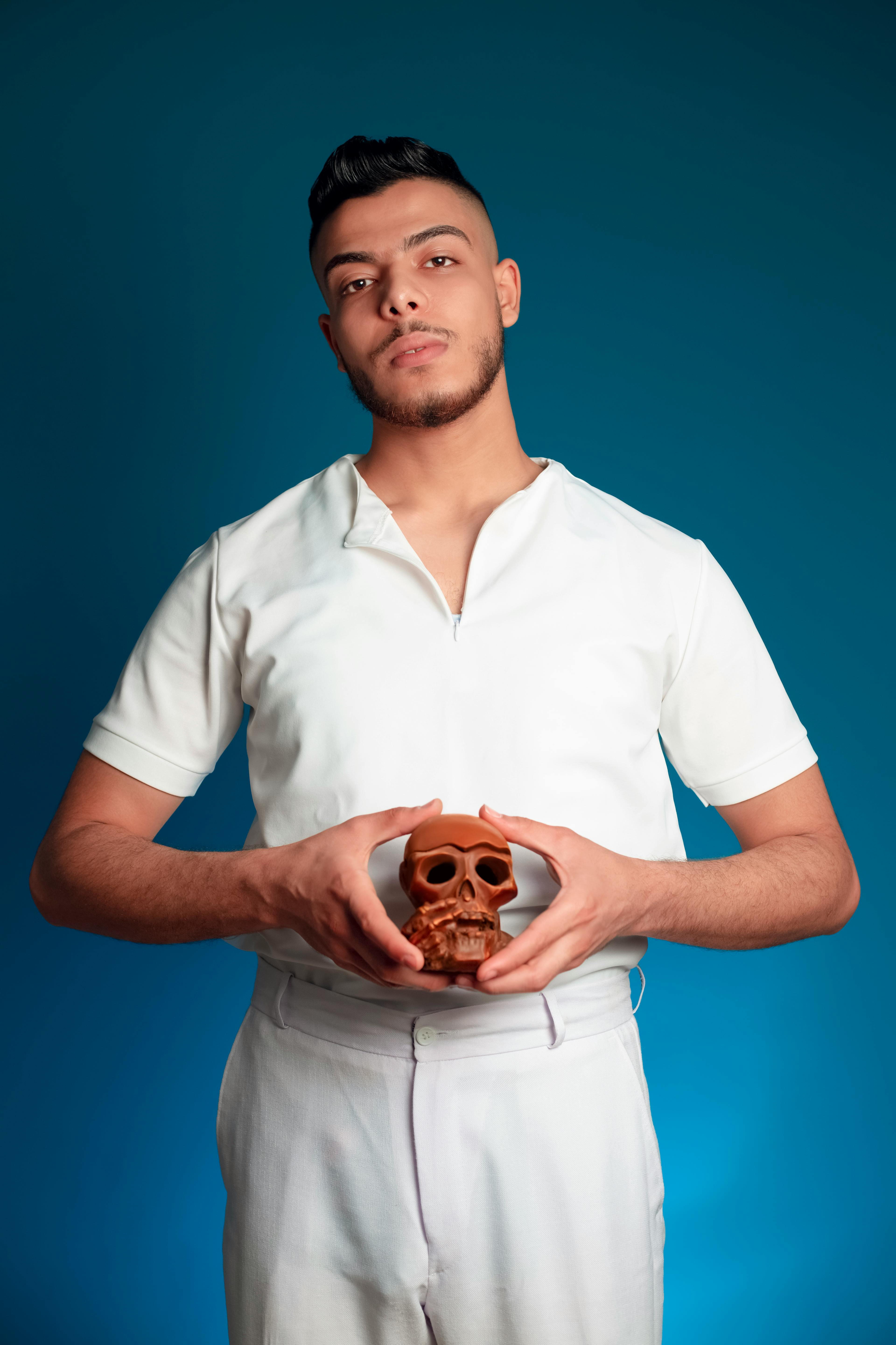 Man Holding Skull · Free Stock Photo