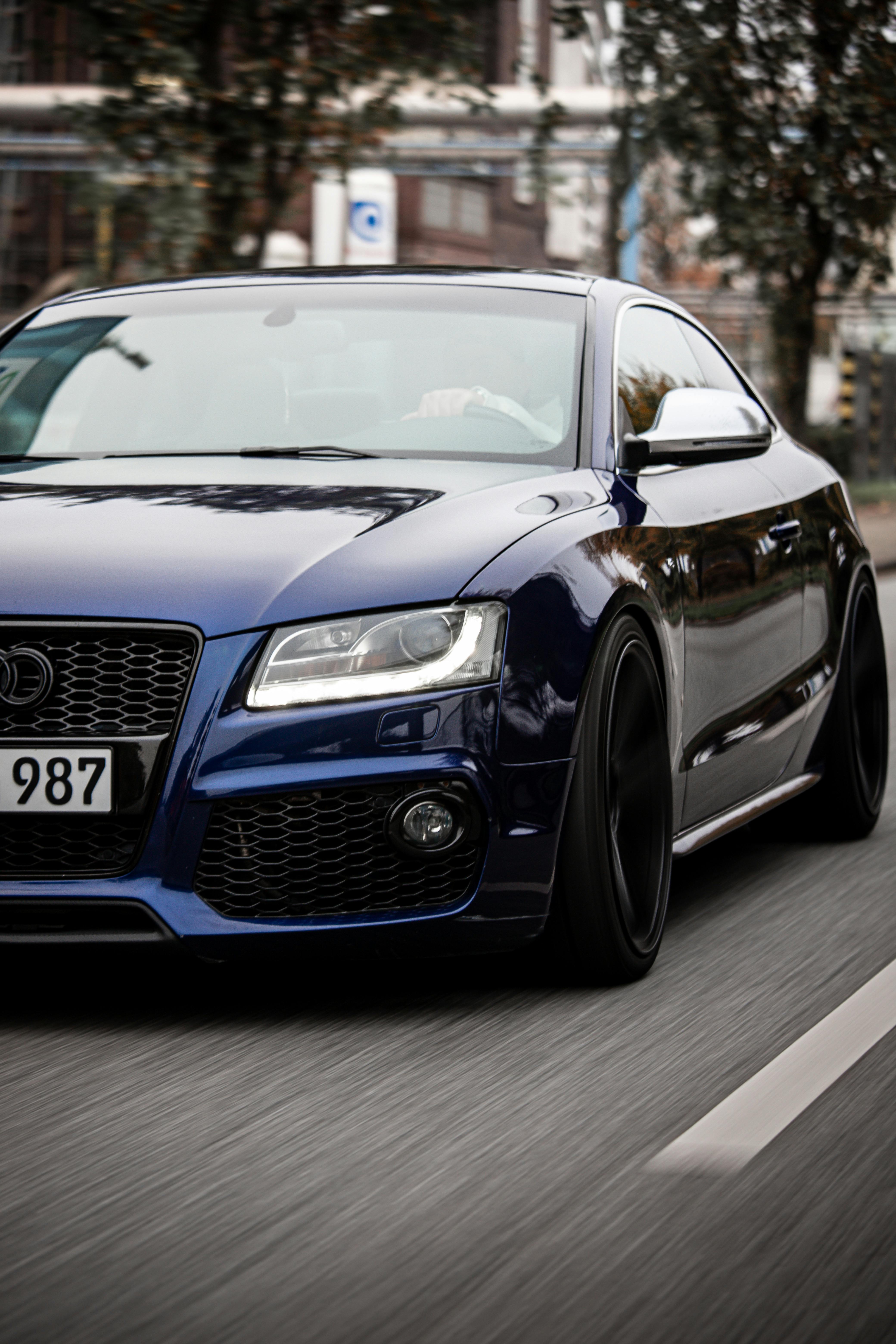 Blue Car on Road · Free Stock Photo