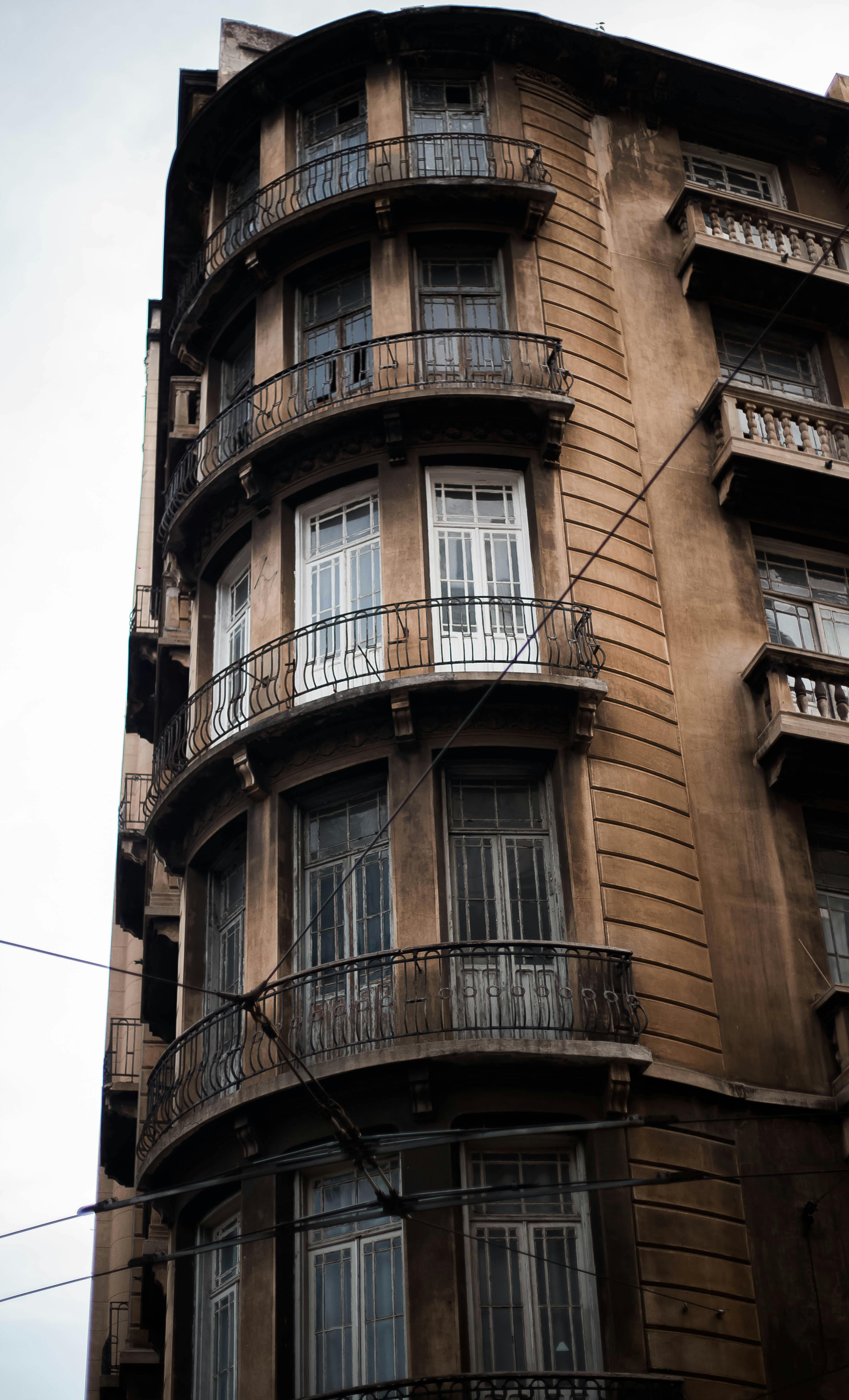 Low Angle View of Curved Building Corner · Free Stock Photo