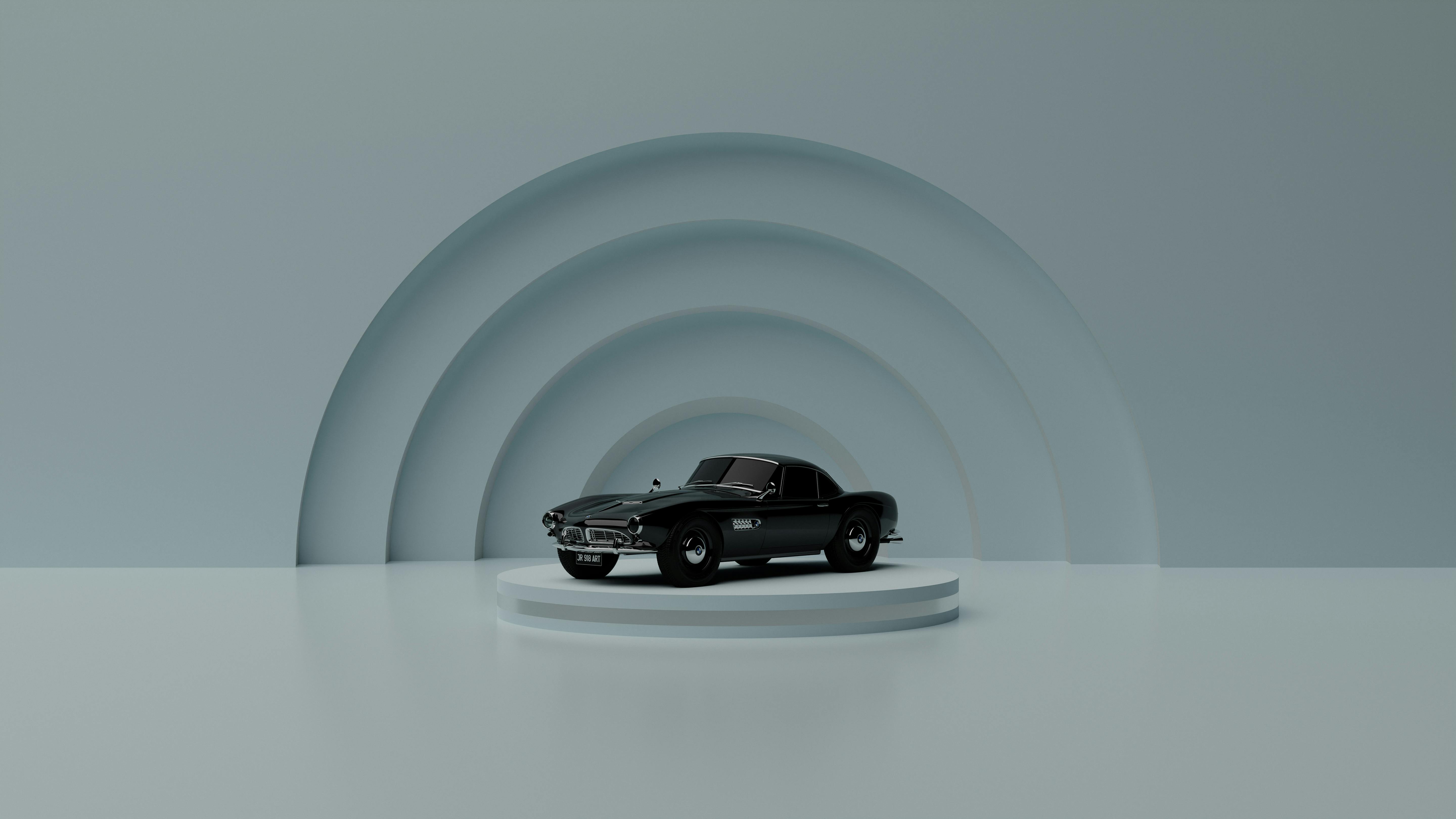 Black BMW 507 on Pedestal under White Wall · Free Stock Photo