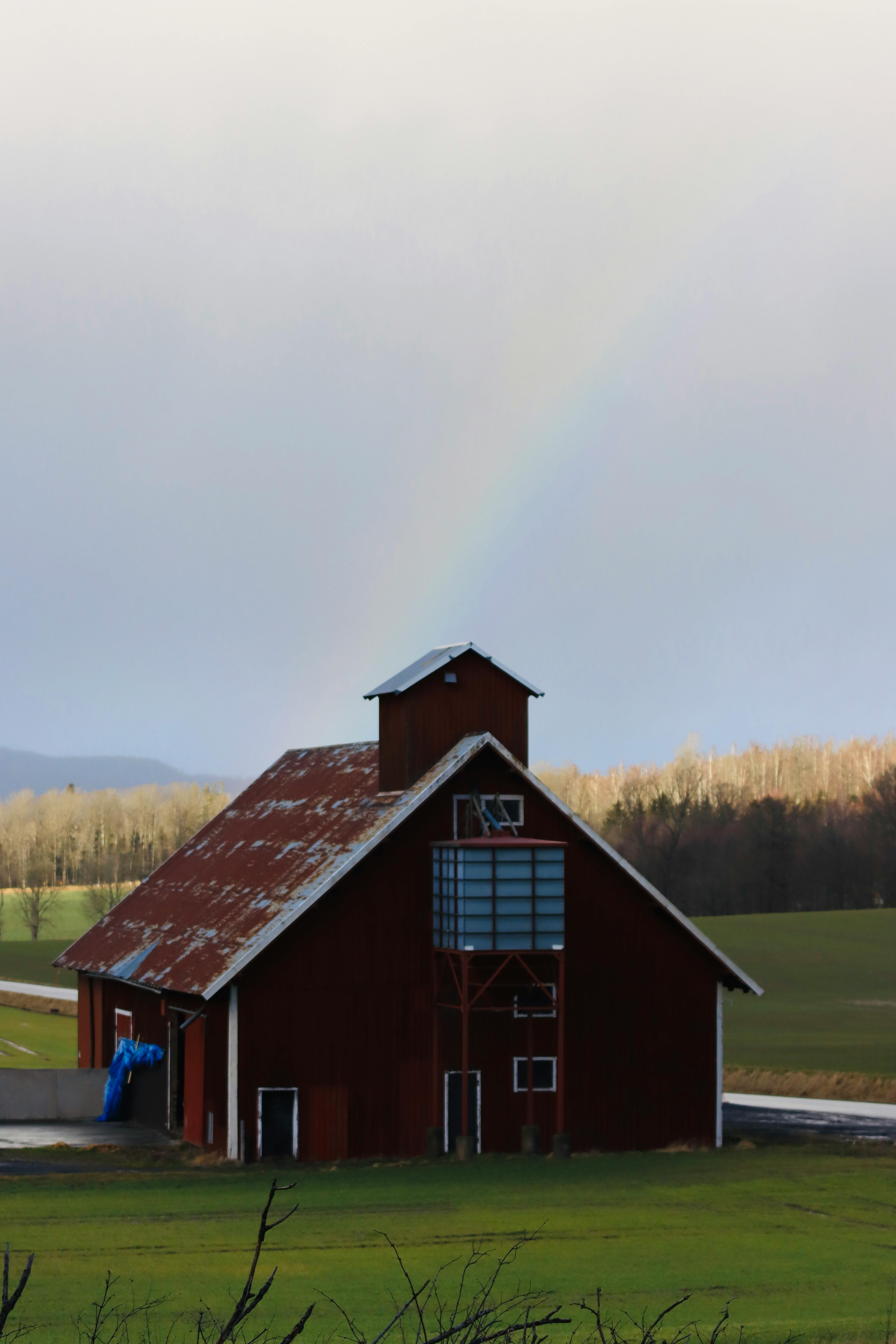 Rainbow over Farmhouse · Free Stock Photo