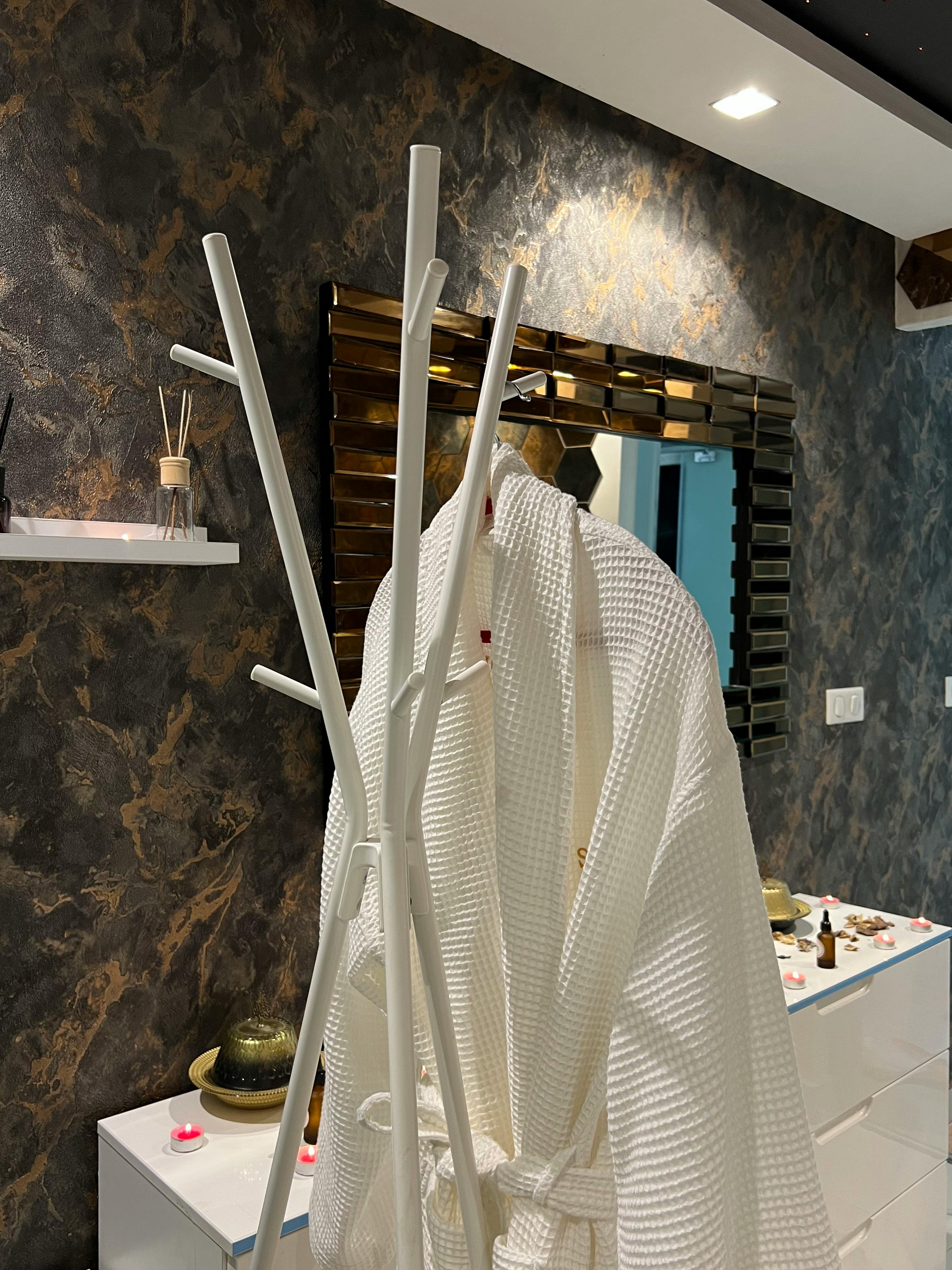 White Robe Hanging on Coat Hanger · Free Stock Photo