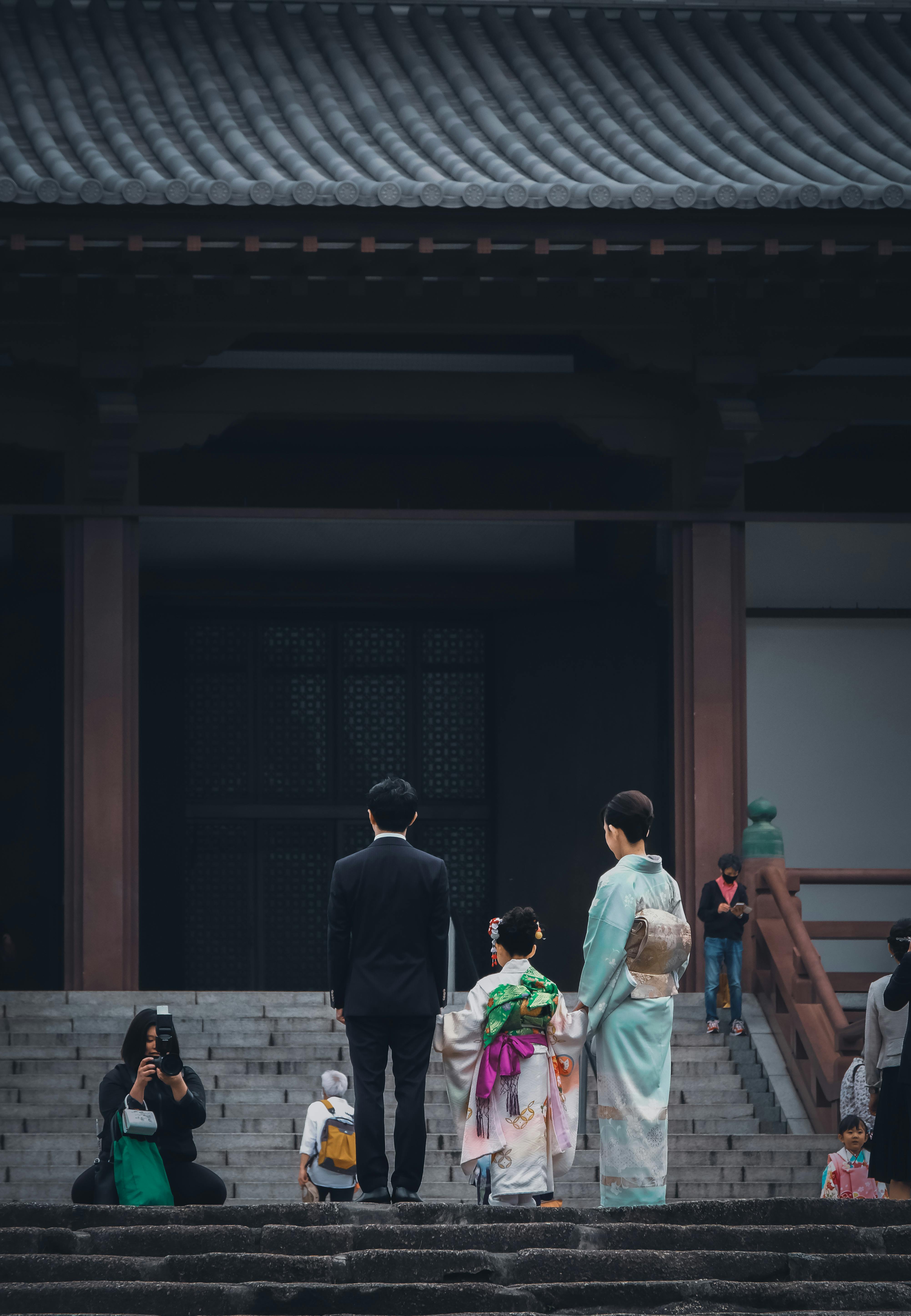 Family in Traditional Japanese Clothes Posing on the Steps of the ...