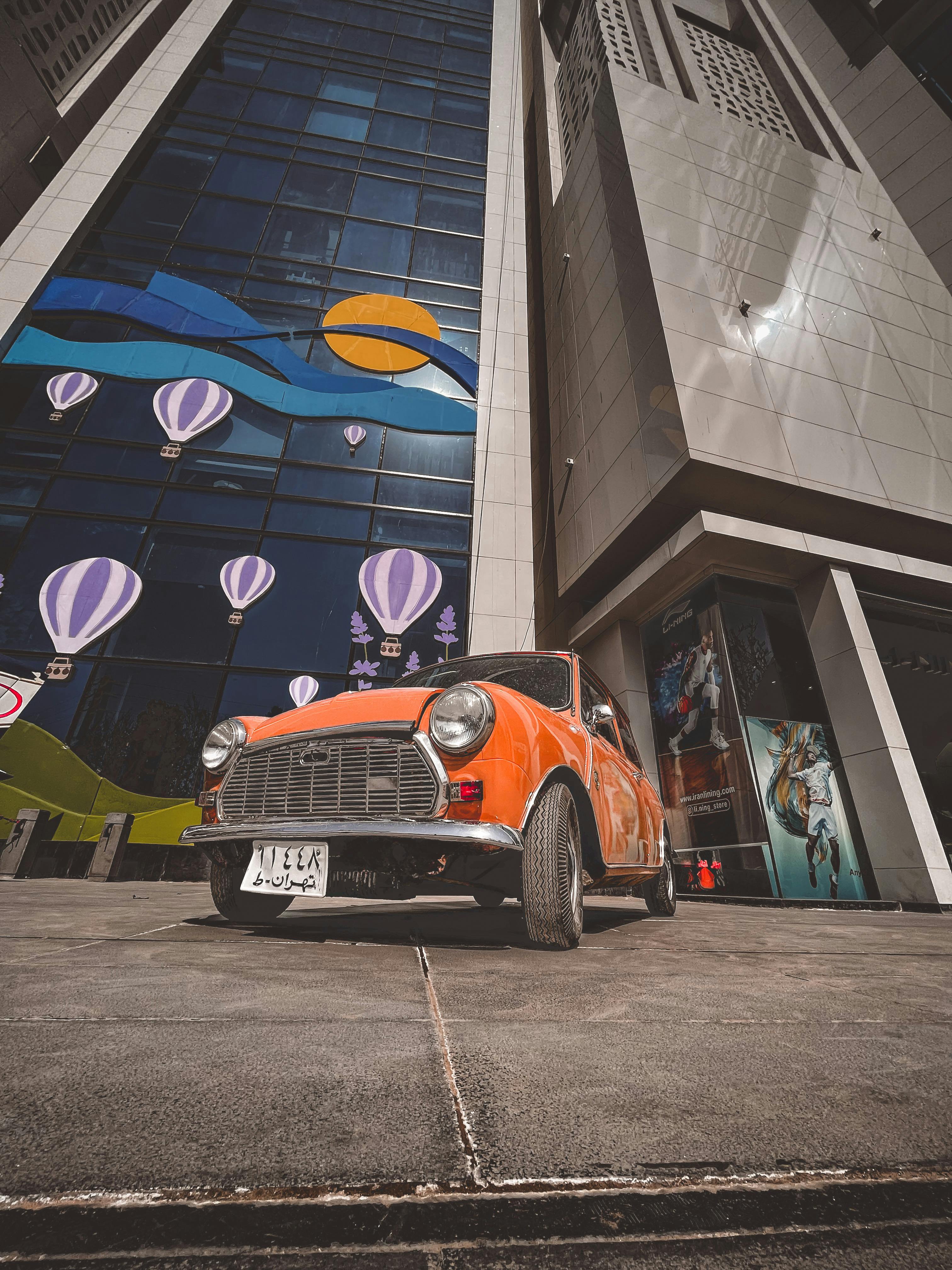 Vintage, Red Car near Building · Free Stock Photo