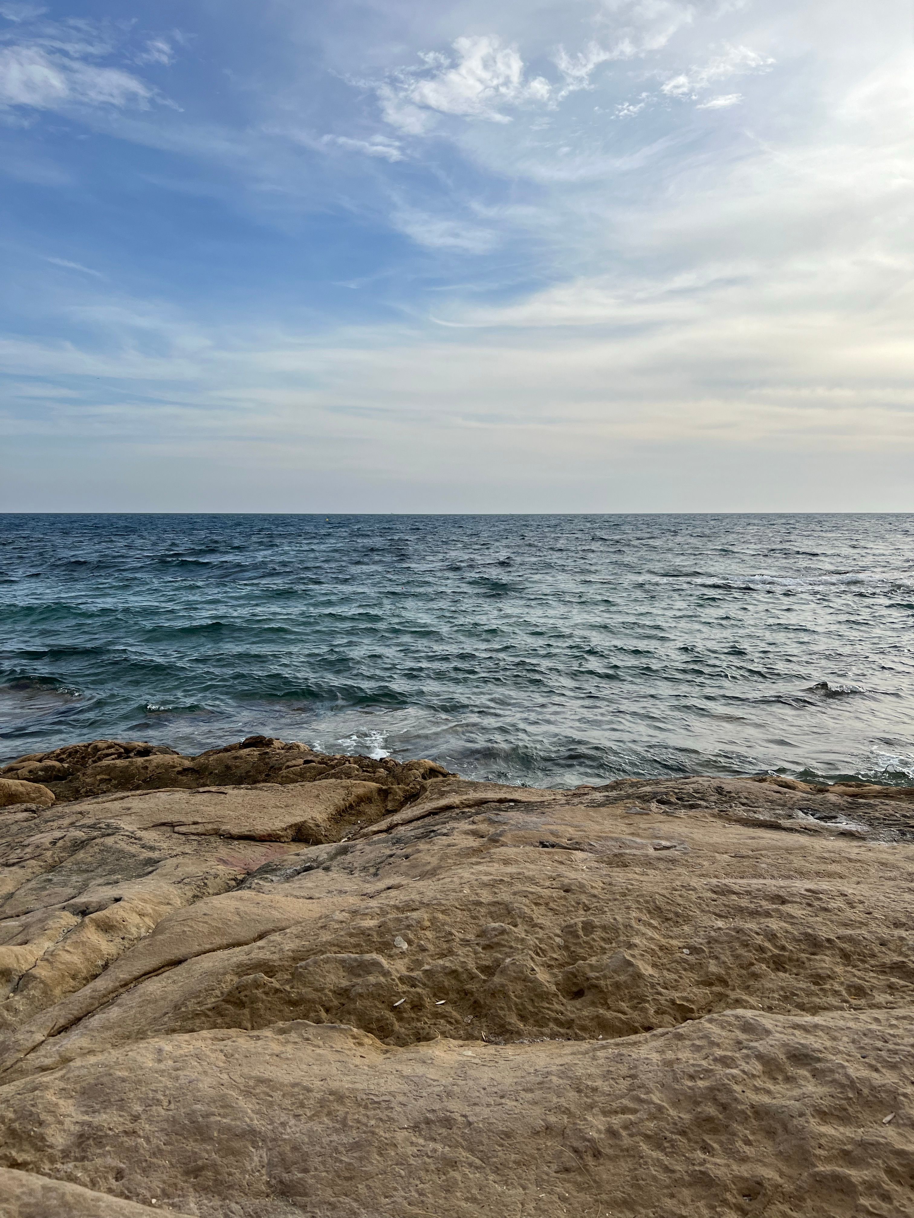 Rocks Forming Arch on Beach · Free Stock Photo