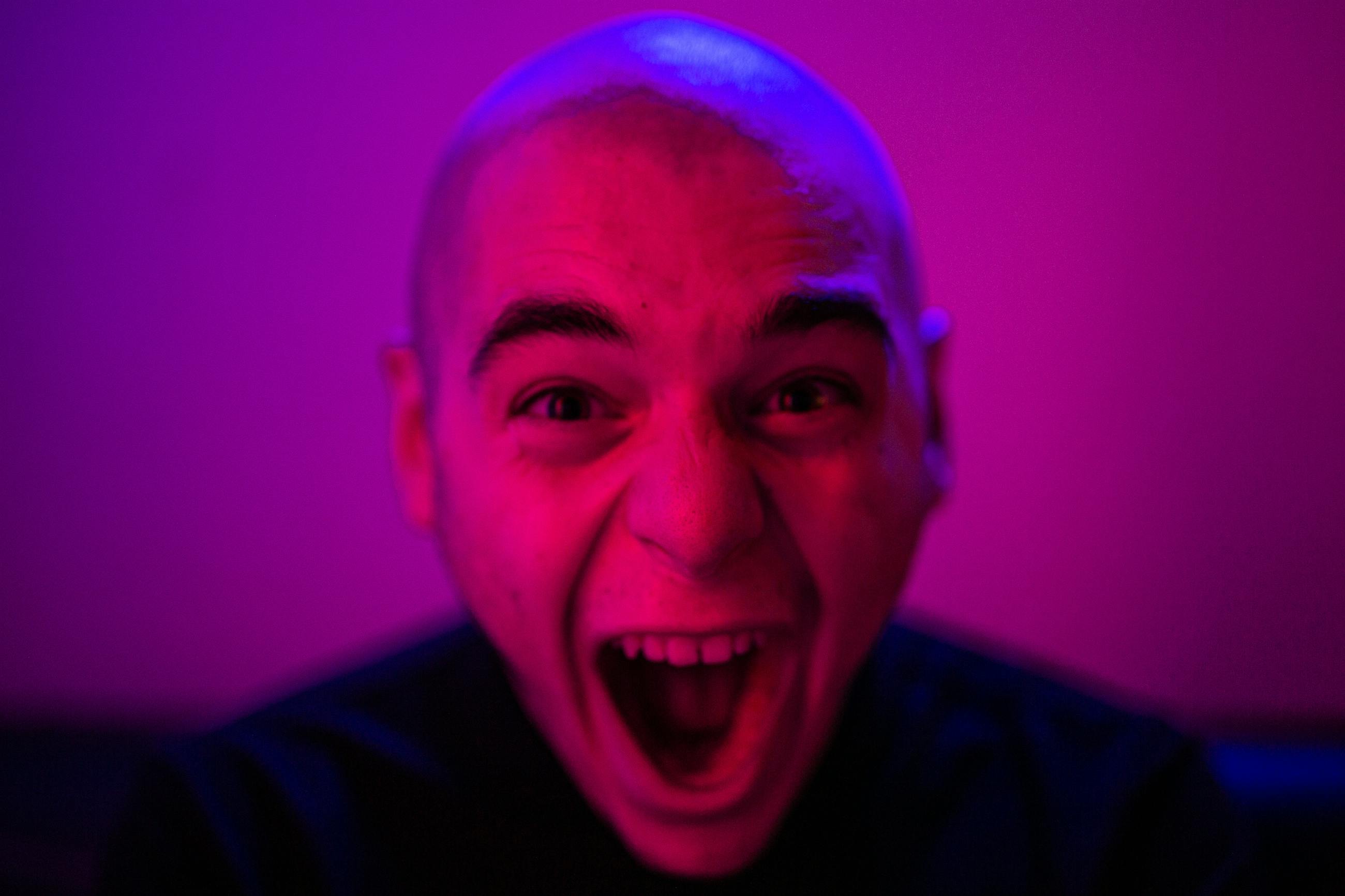 Close Up Photo of Man Screaming · Free Stock Photo