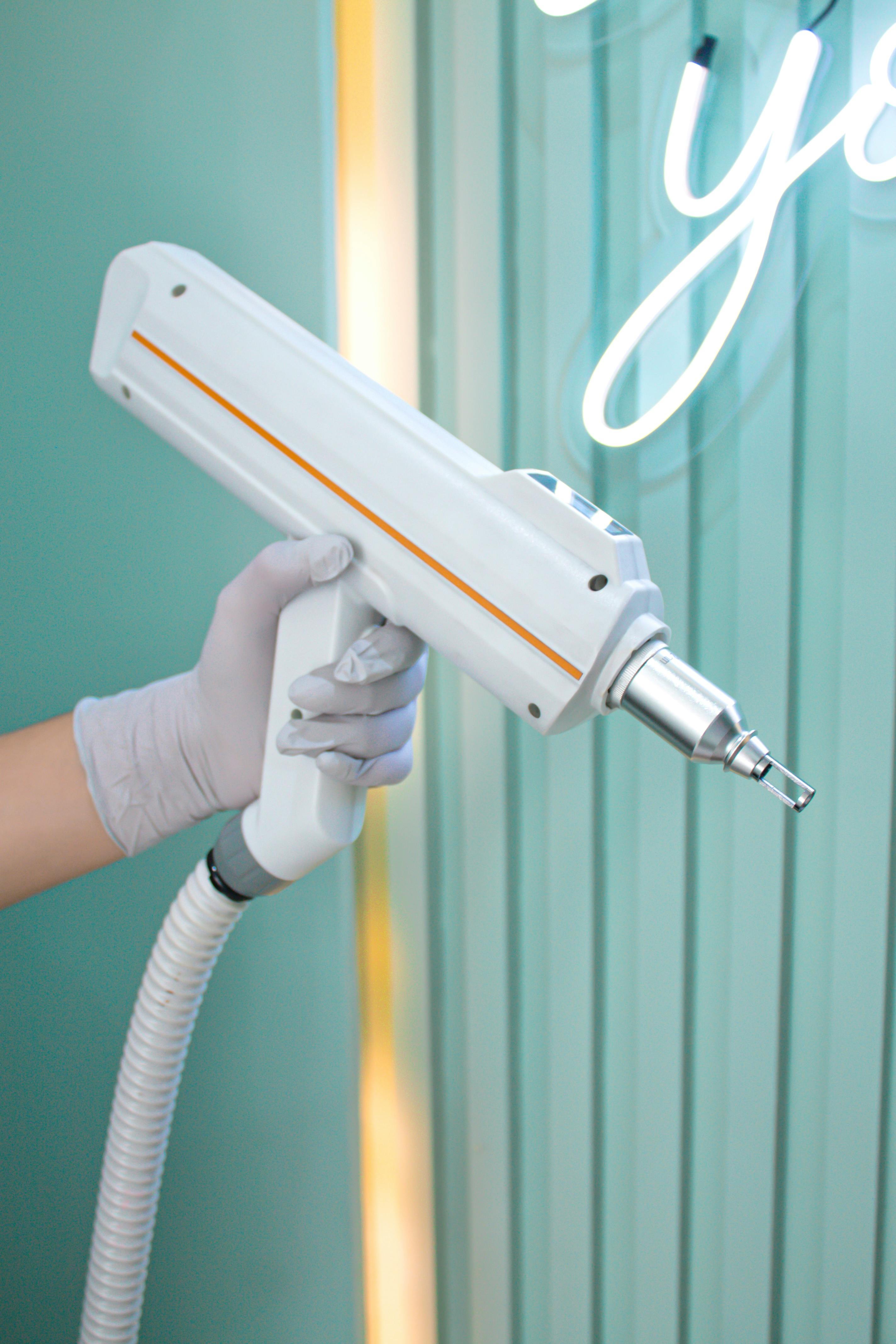 Hand in Glove Holding Medical Device · Free Stock Photo