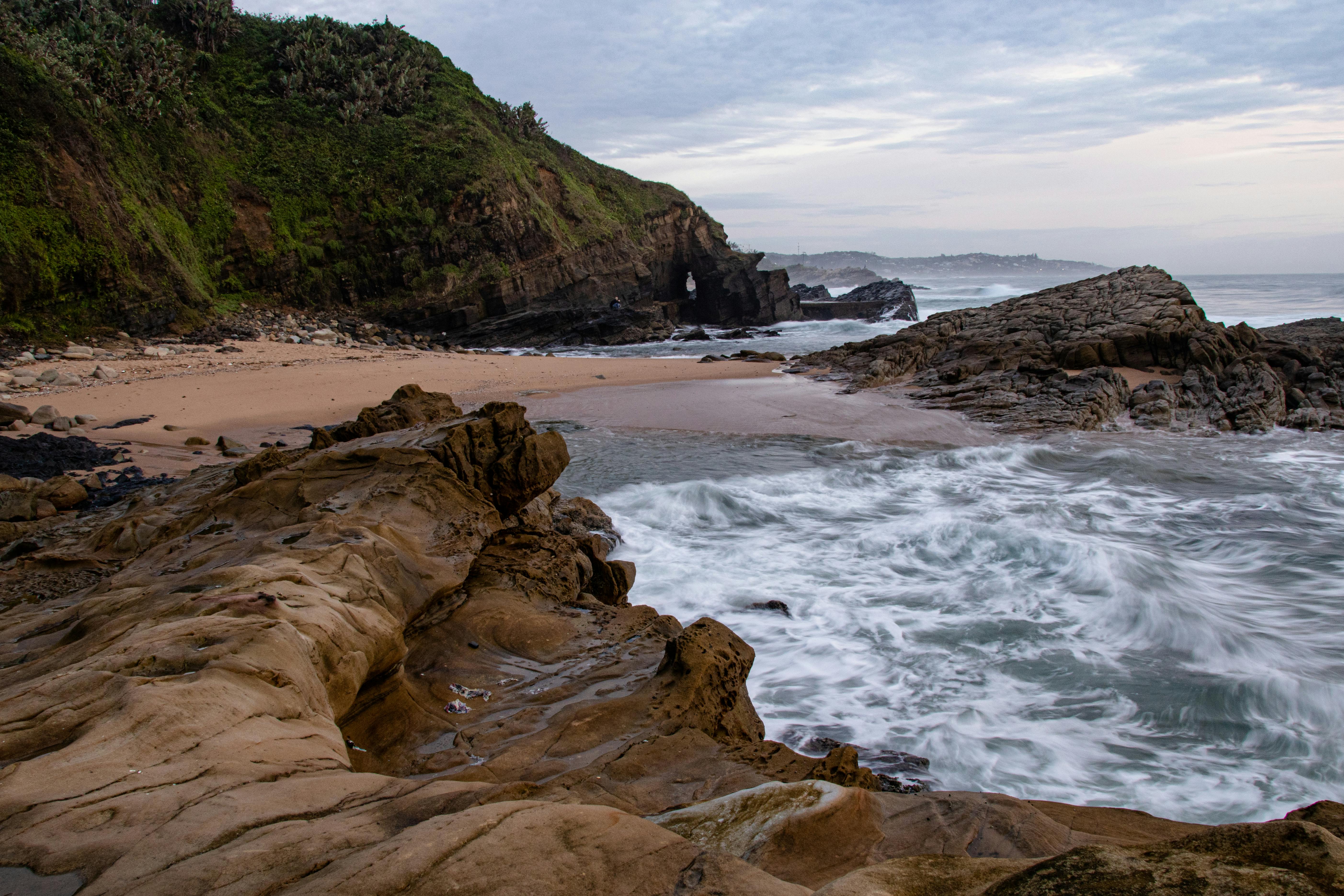 Landscape Photography of a Rocky Beach · Free Stock Photo