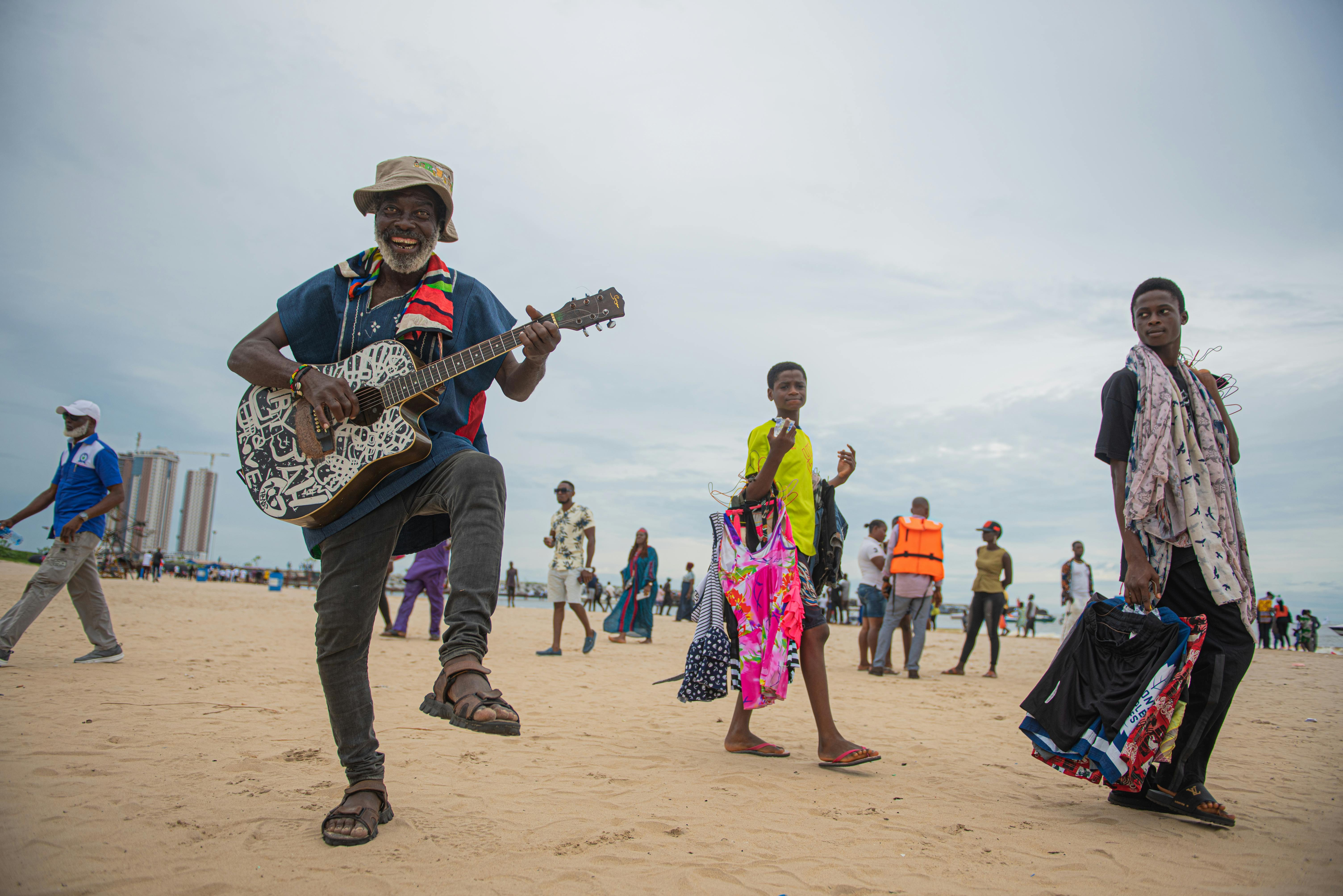People Playing Music on Beach · Free Stock Photo