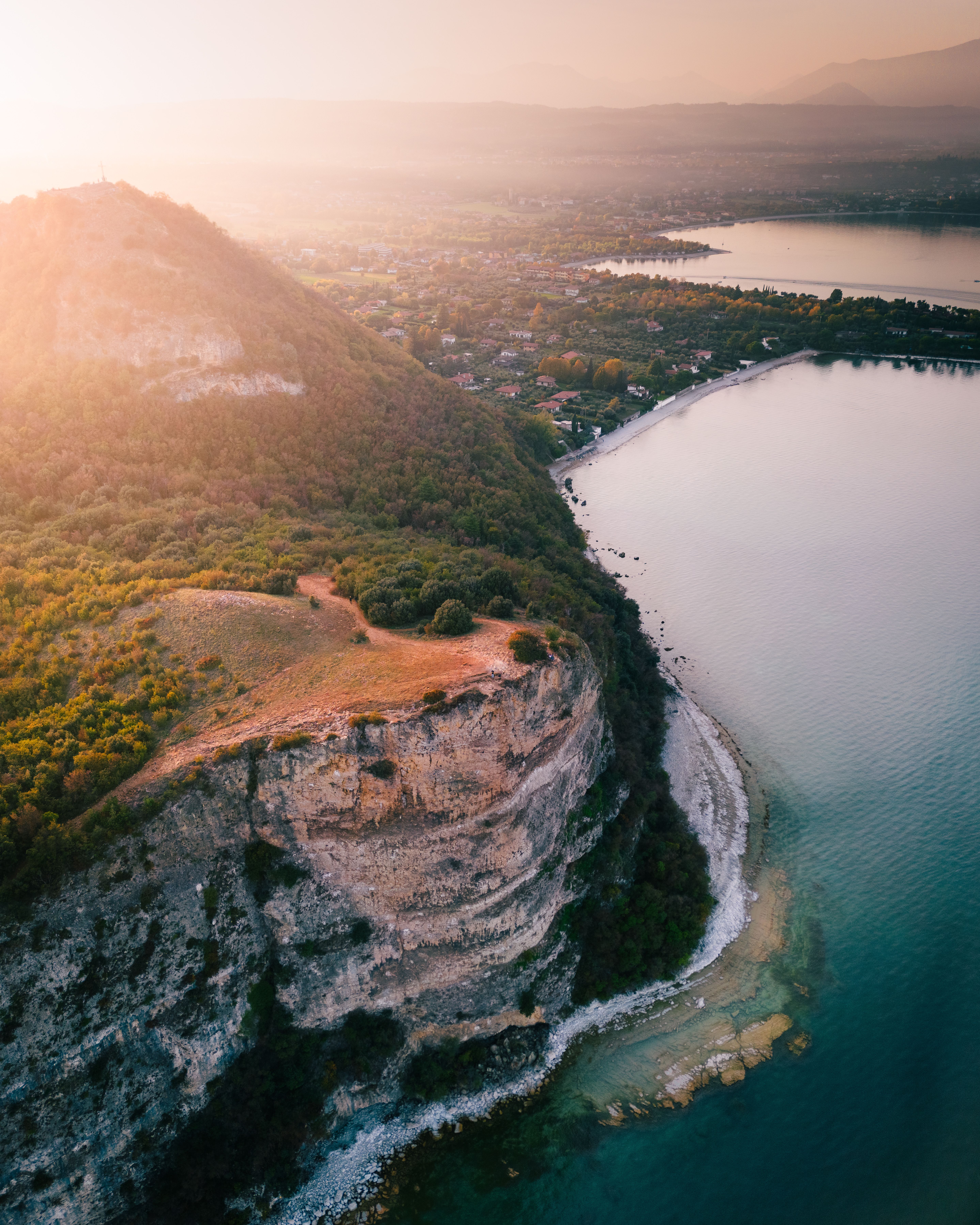 Aerial View of a Coastal Cliff at Sunset · Free Stock Photo