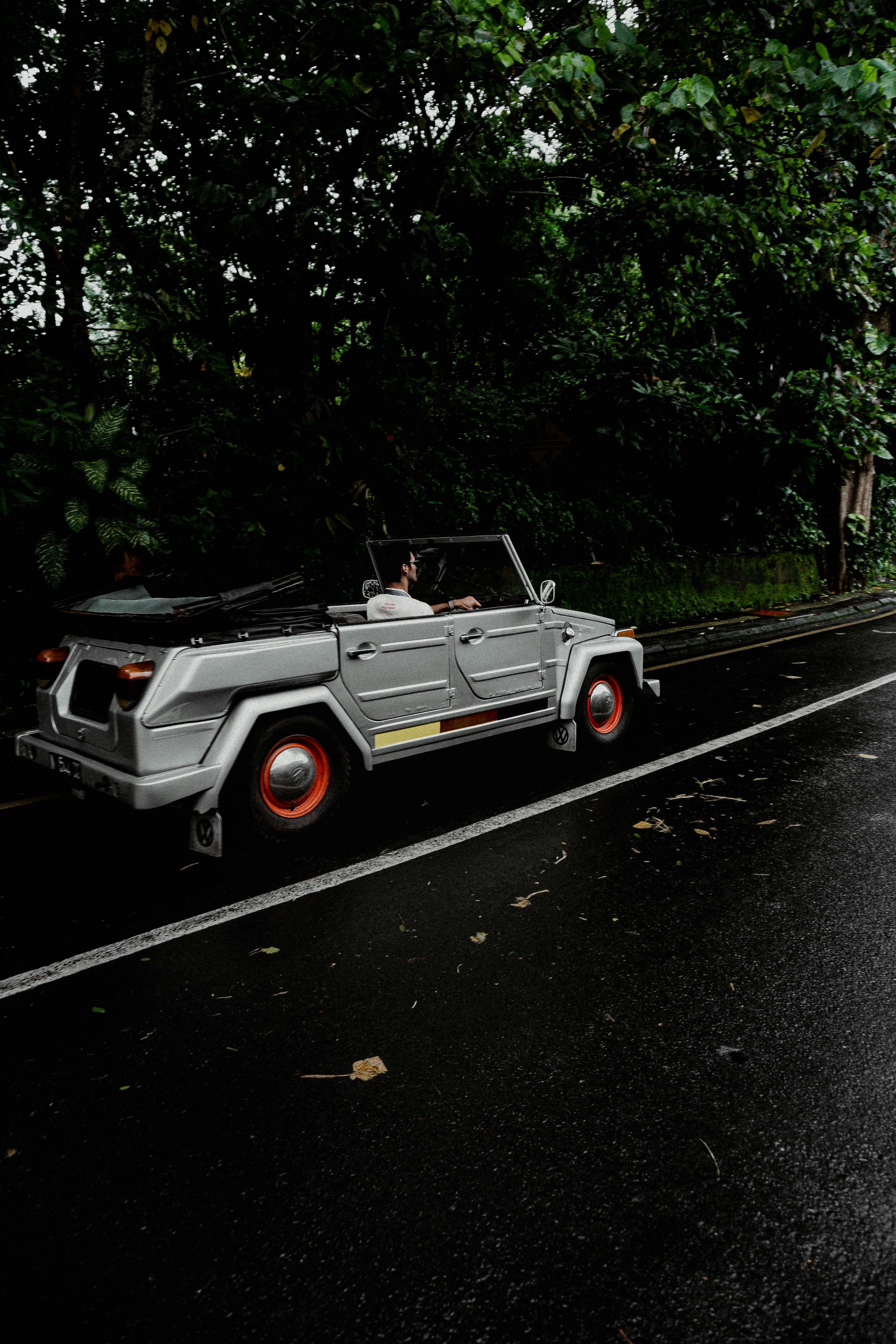 A Woman Driving a Top Down Vehicle · Free Stock Photo
