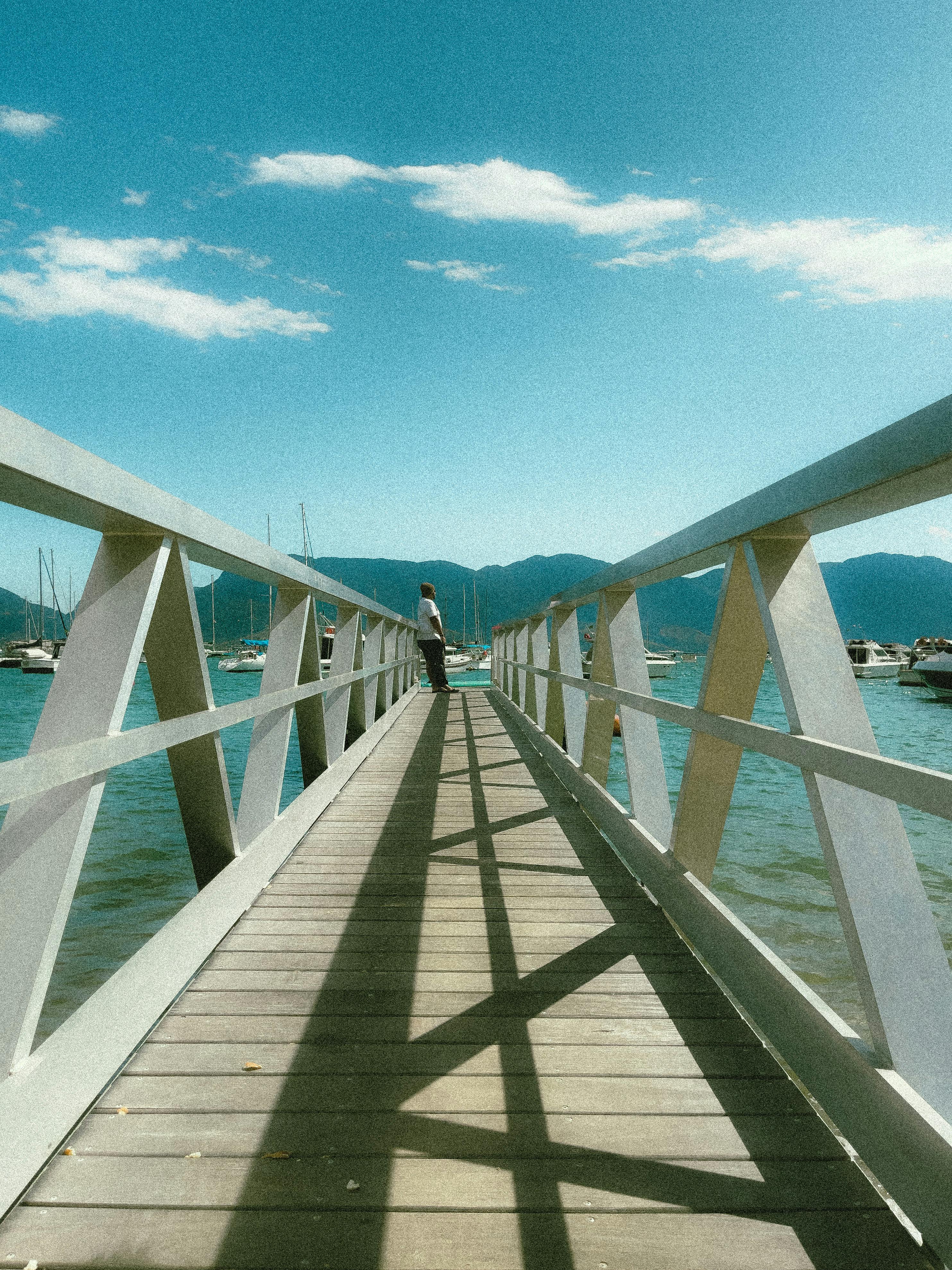 Urban Footbridge with Yellow Railing · Free Stock Photo