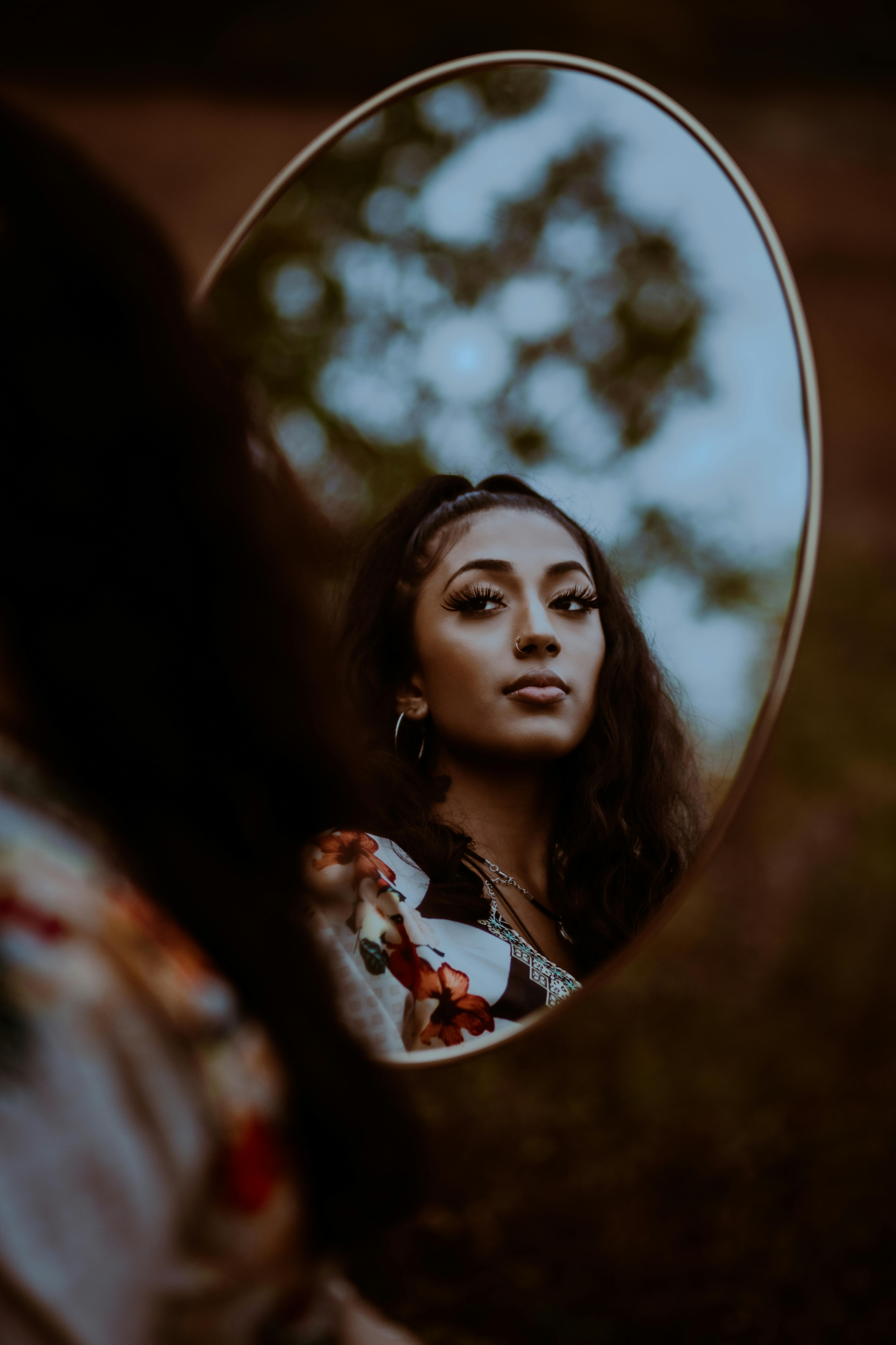 Reflection of Pretty Girl in Mirror · Free Stock Photo