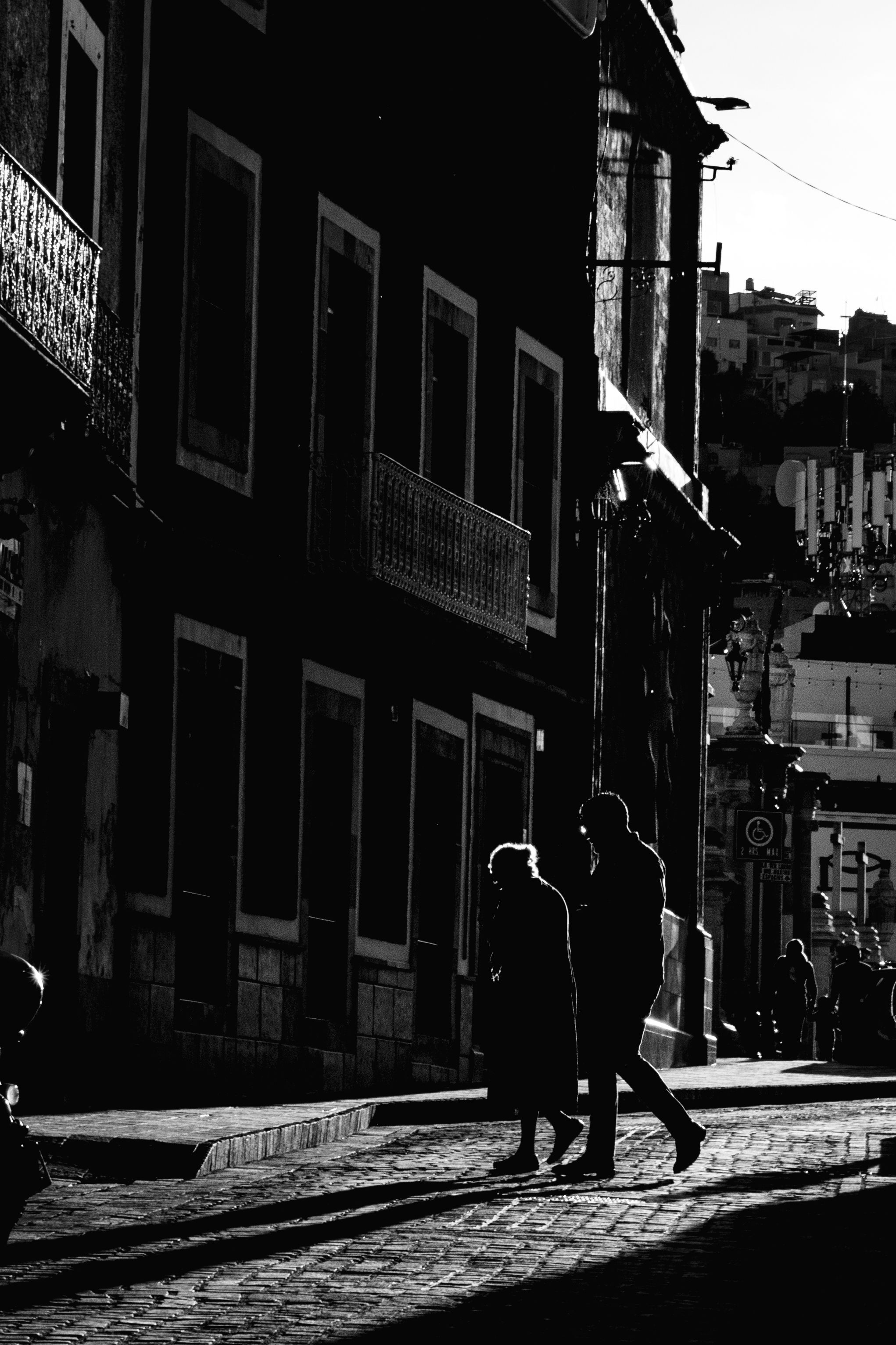 Grayscale Photography of People in Traditional Clothing Walking on the ...